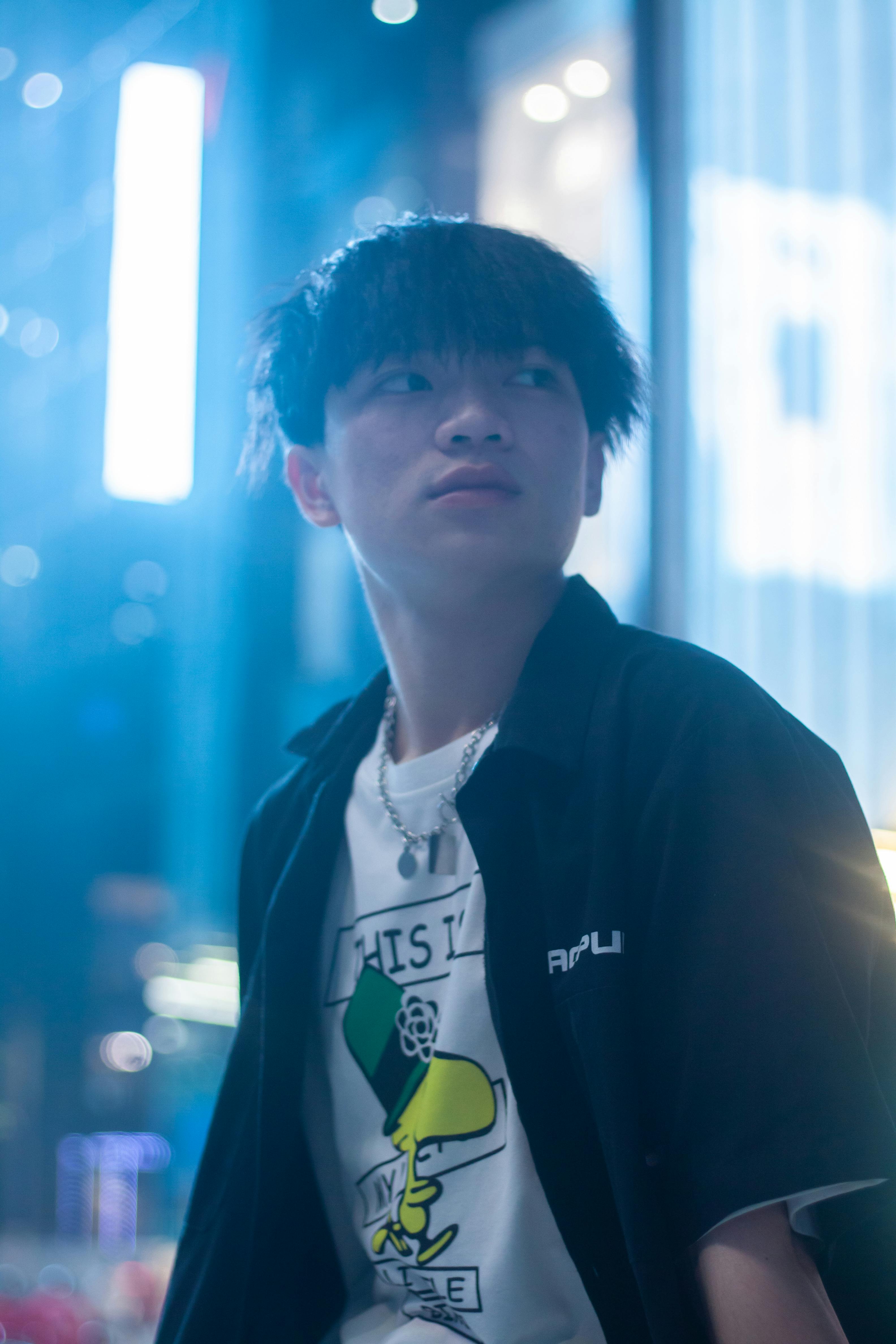 Close-Up Shot of a Boy Wearing Black Jacket · Free Stock Photo