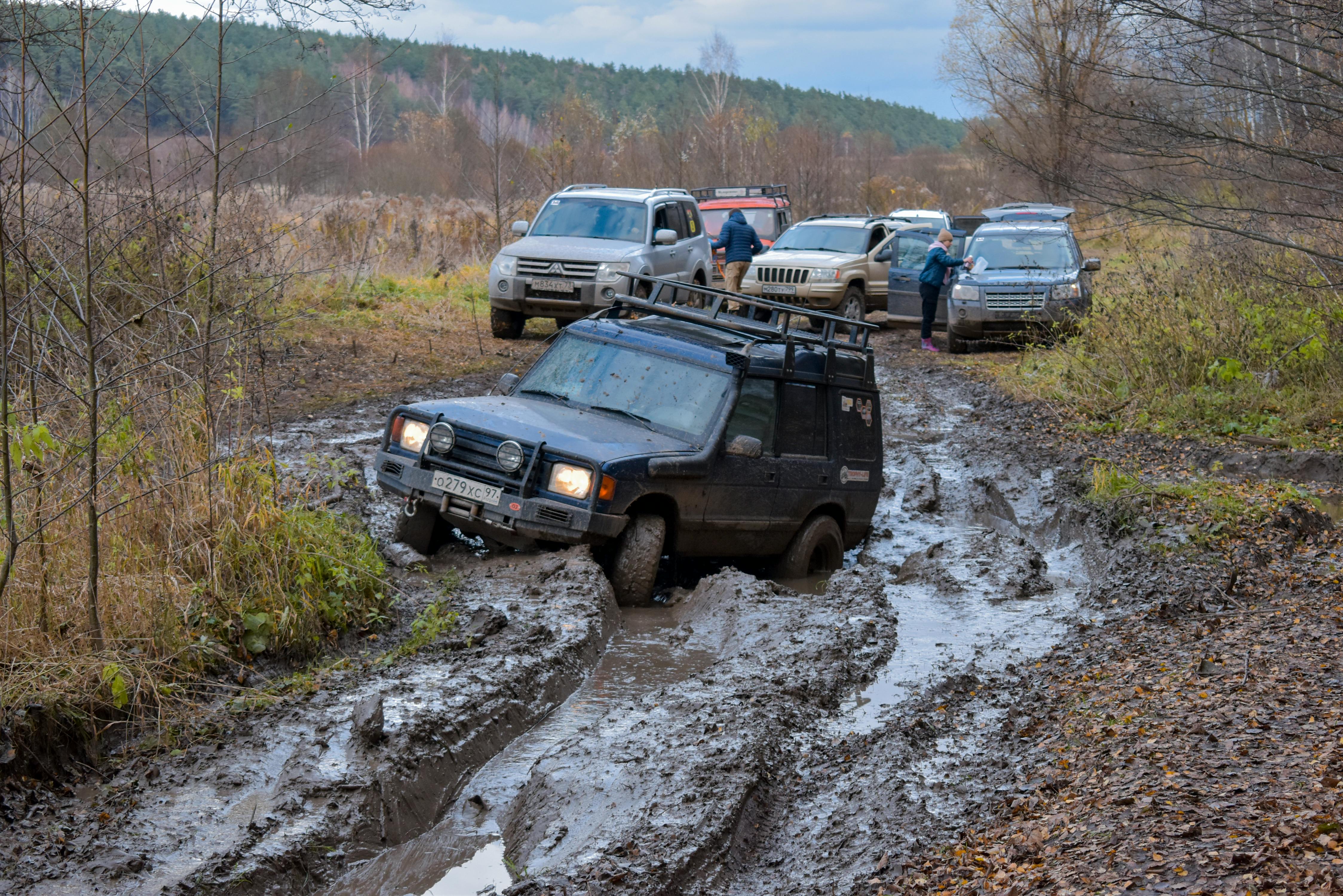 Car Stuck on Muddy Road · Free Stock Photo