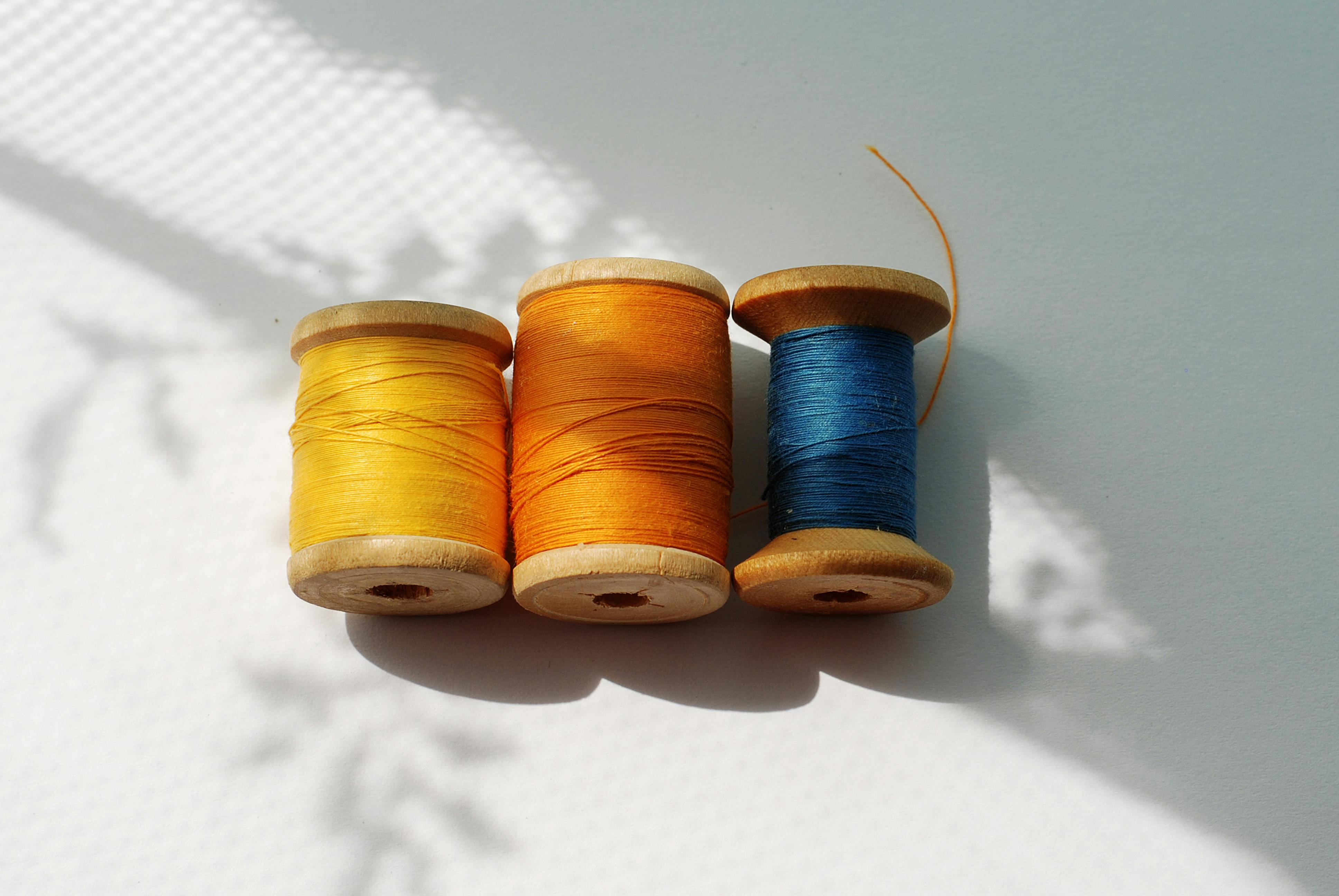 Colorful Spools of Thread · Free Stock Photo