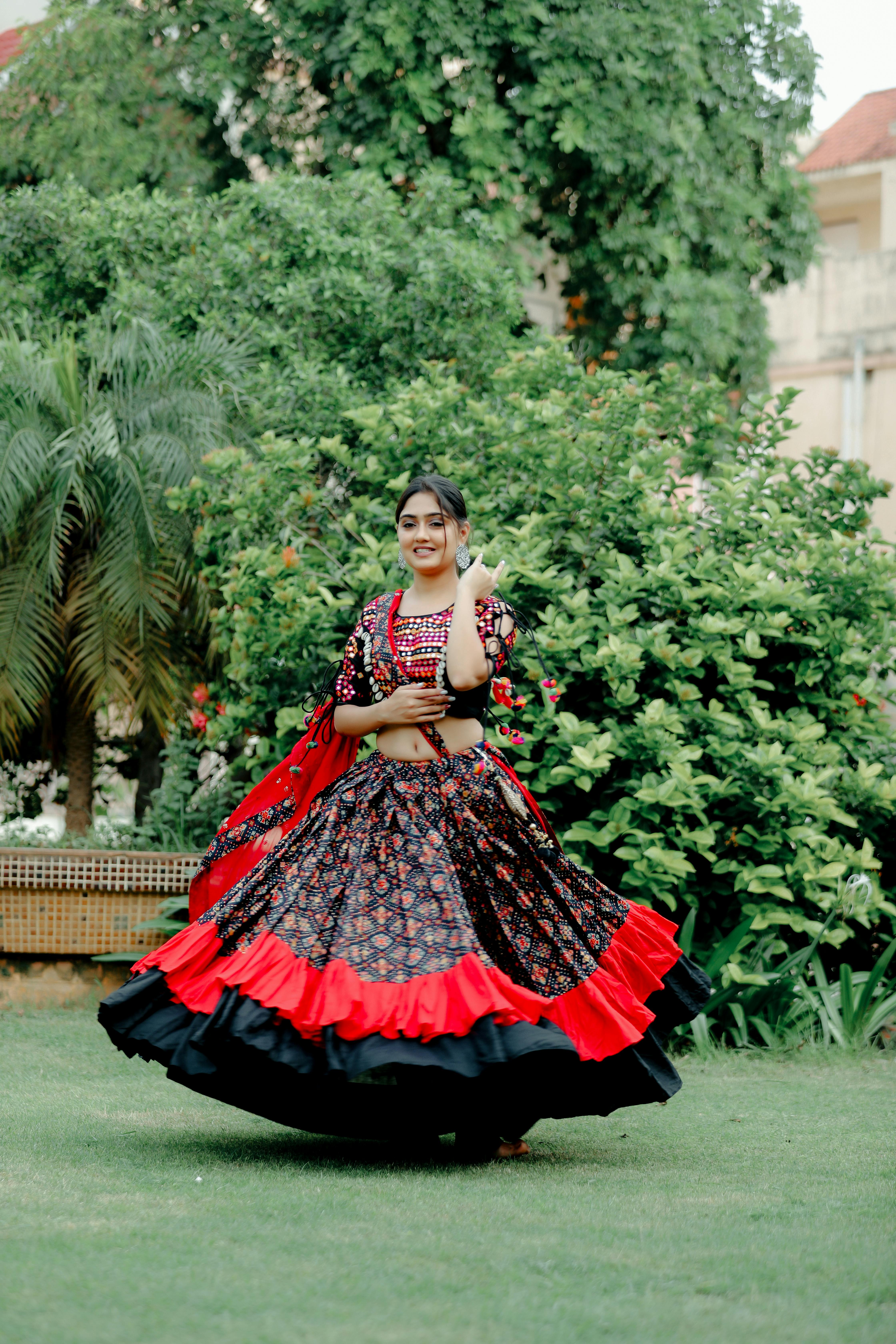 Woman in Traditional Dress at Park · Free Stock Photo