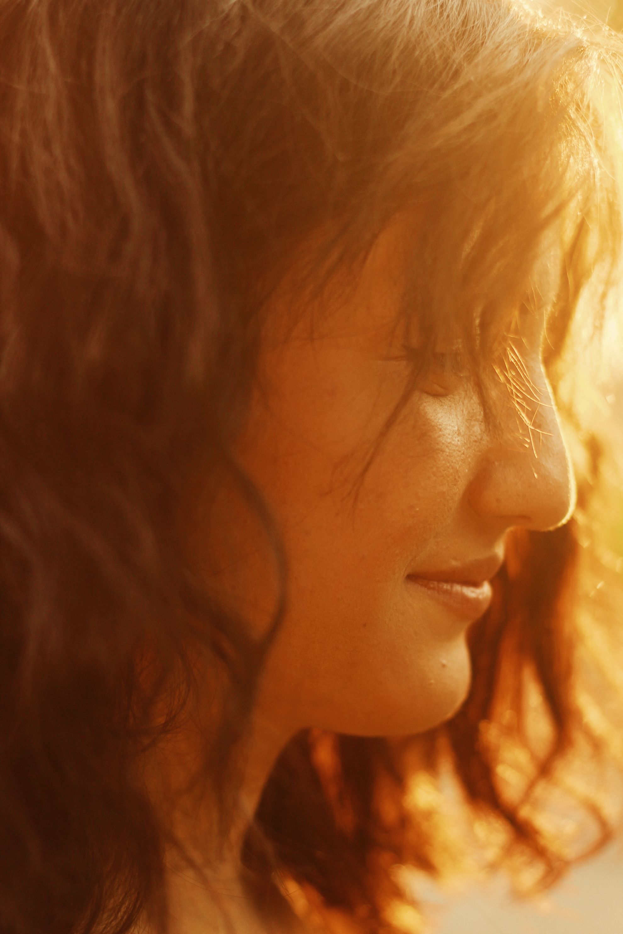 Side View of a Woman in Close-up Shot · Free Stock Photo
