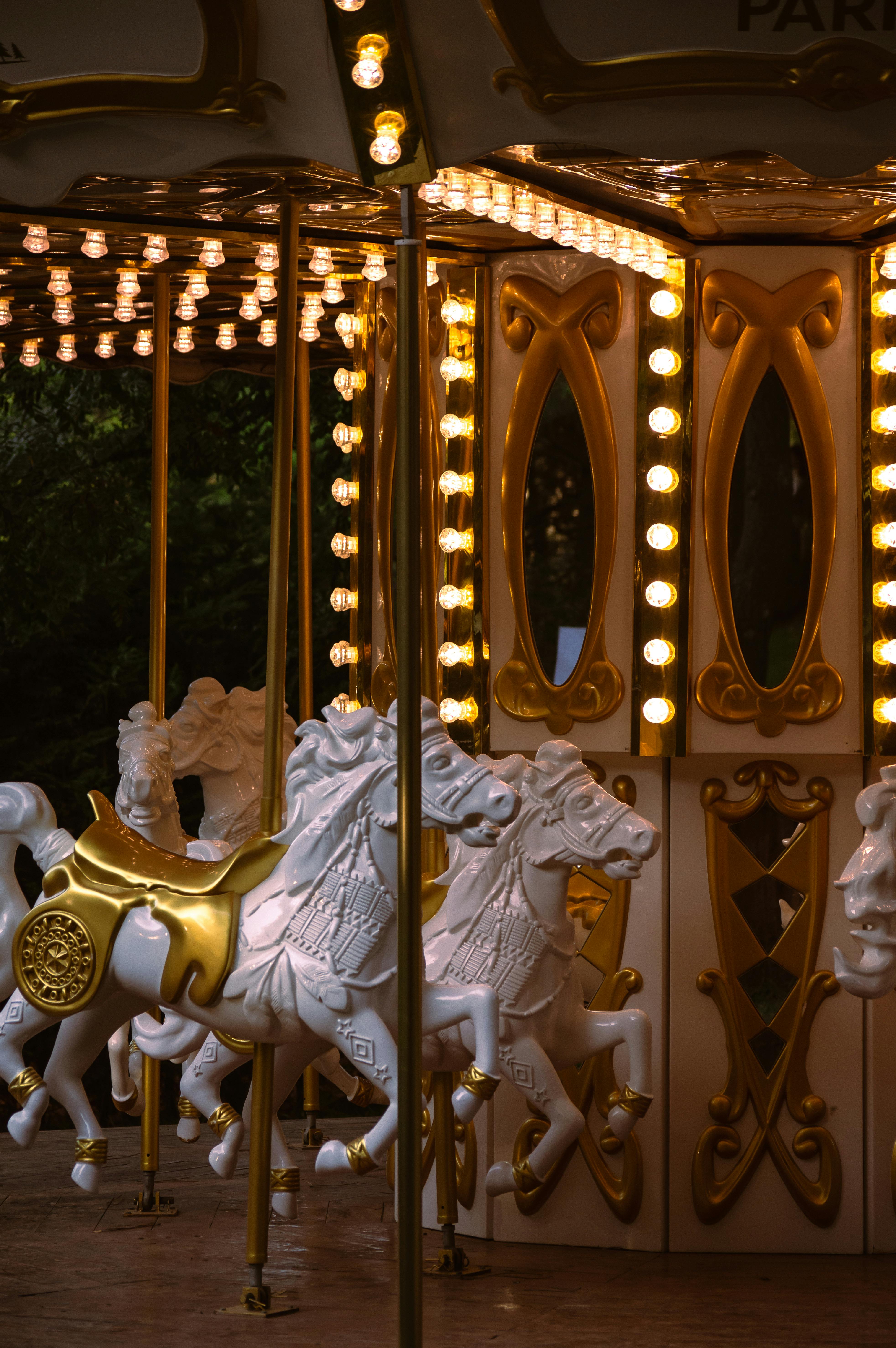 Carousel with Mirrors and Lightbulbs · Free Stock Photo
