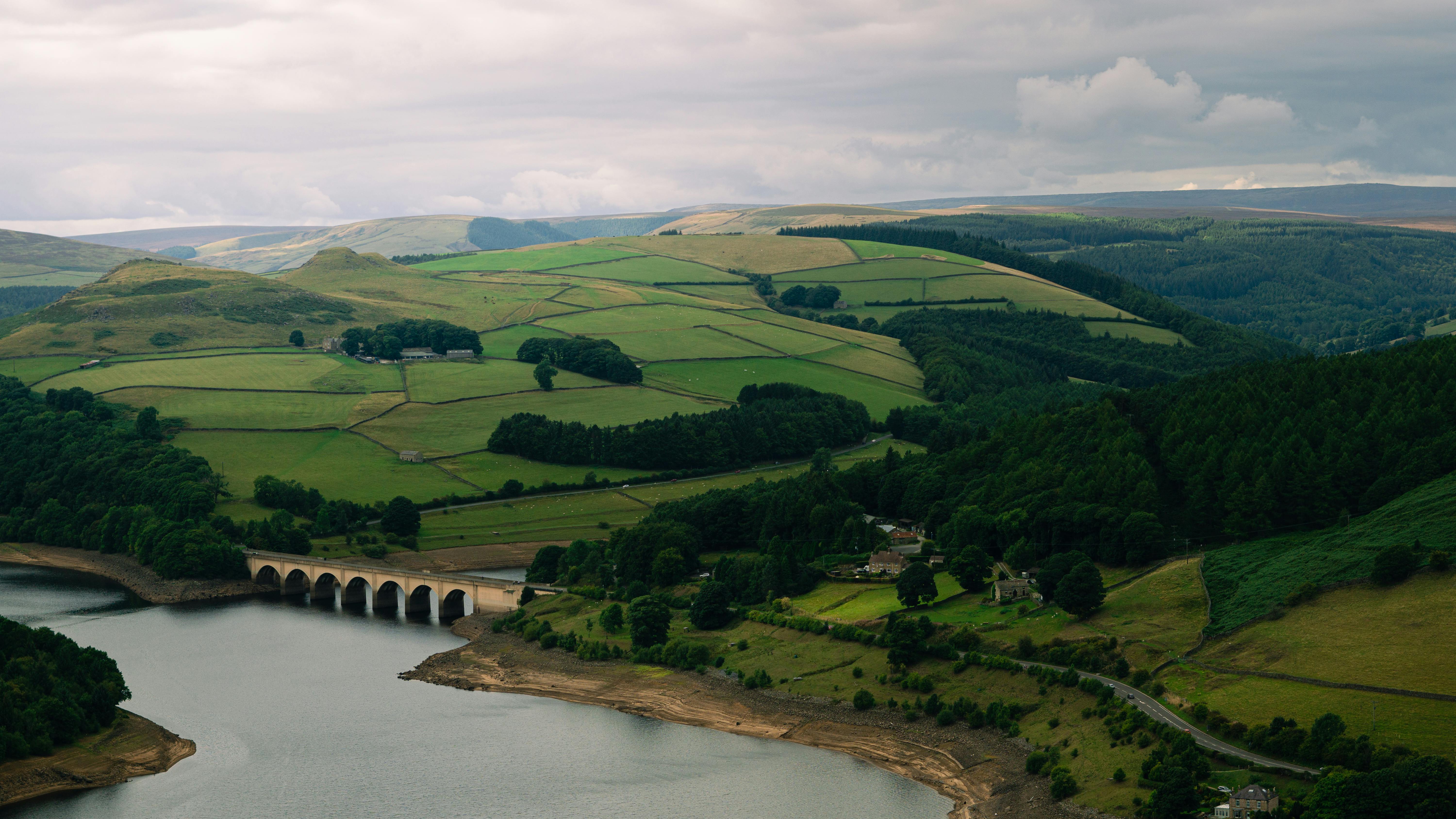 Clouds over Hill and River · Free Stock Photo