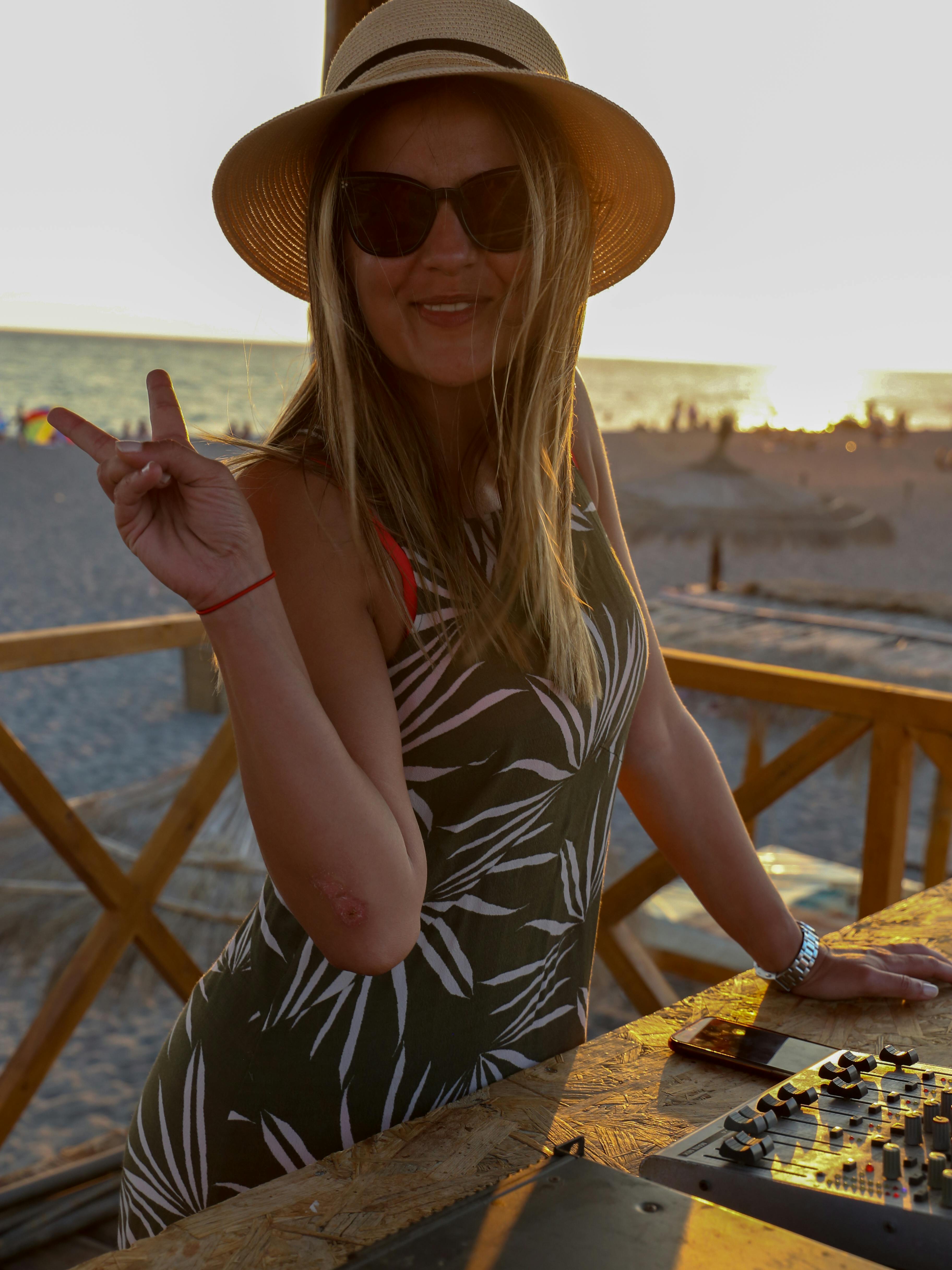 Shells on Woman Leg on Beach · Free Stock Photo