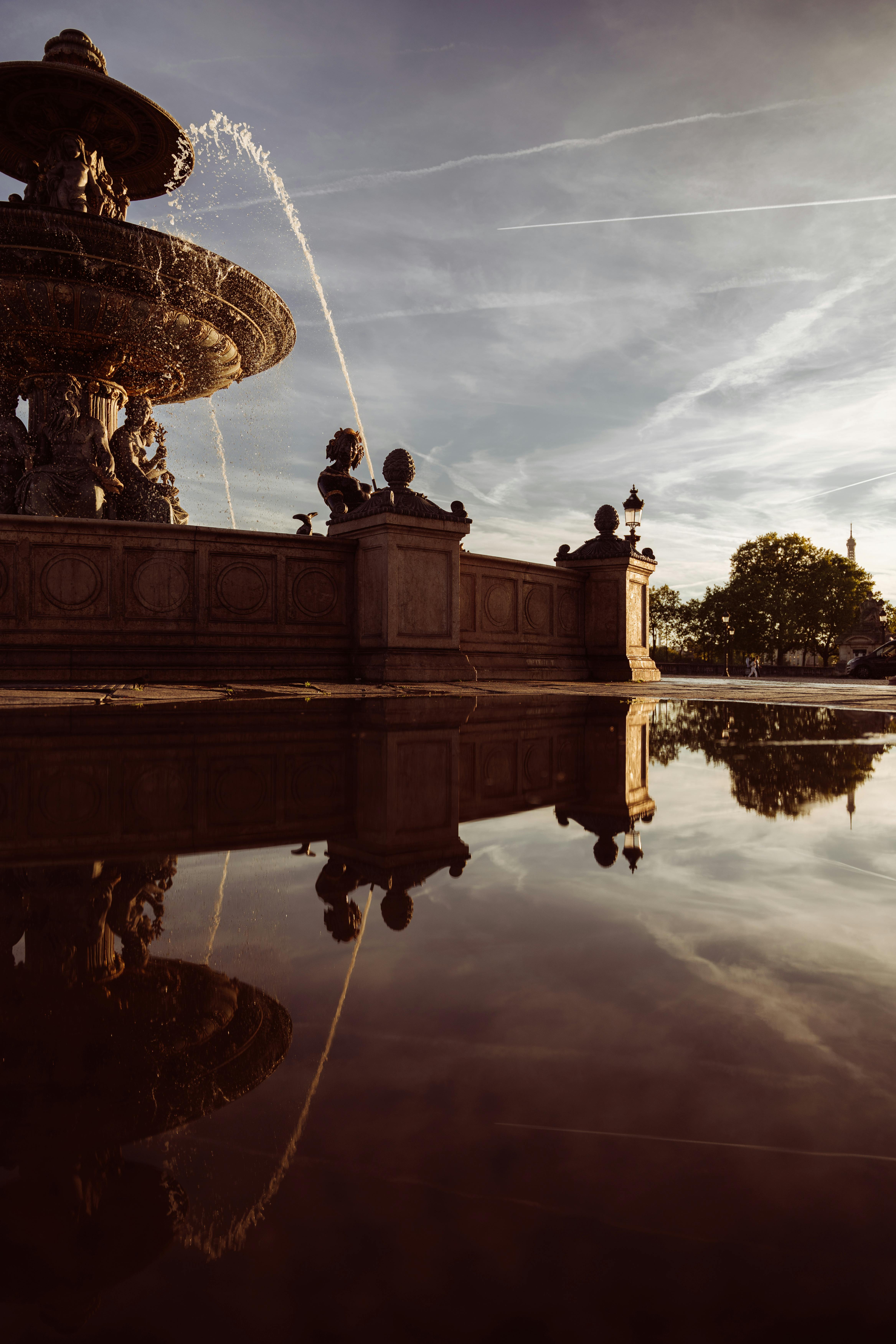 Fountain Reflection in Water · Free Stock Photo