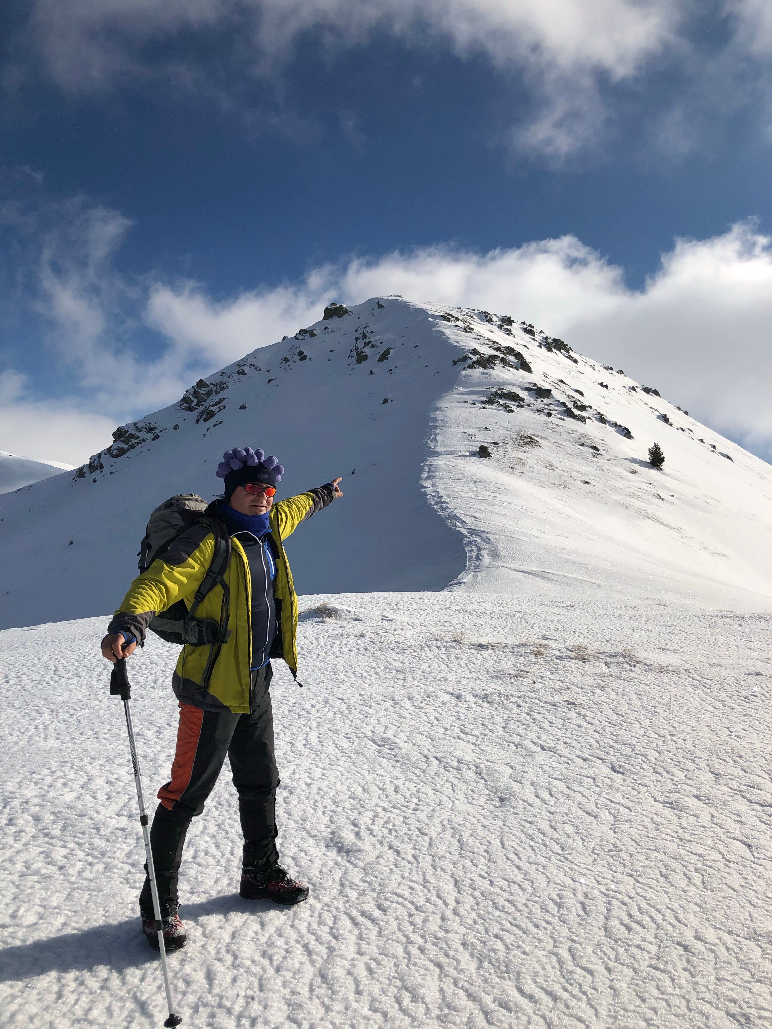 Mountaineer Pointing to the Top of the Mountain · Free Stock Photo