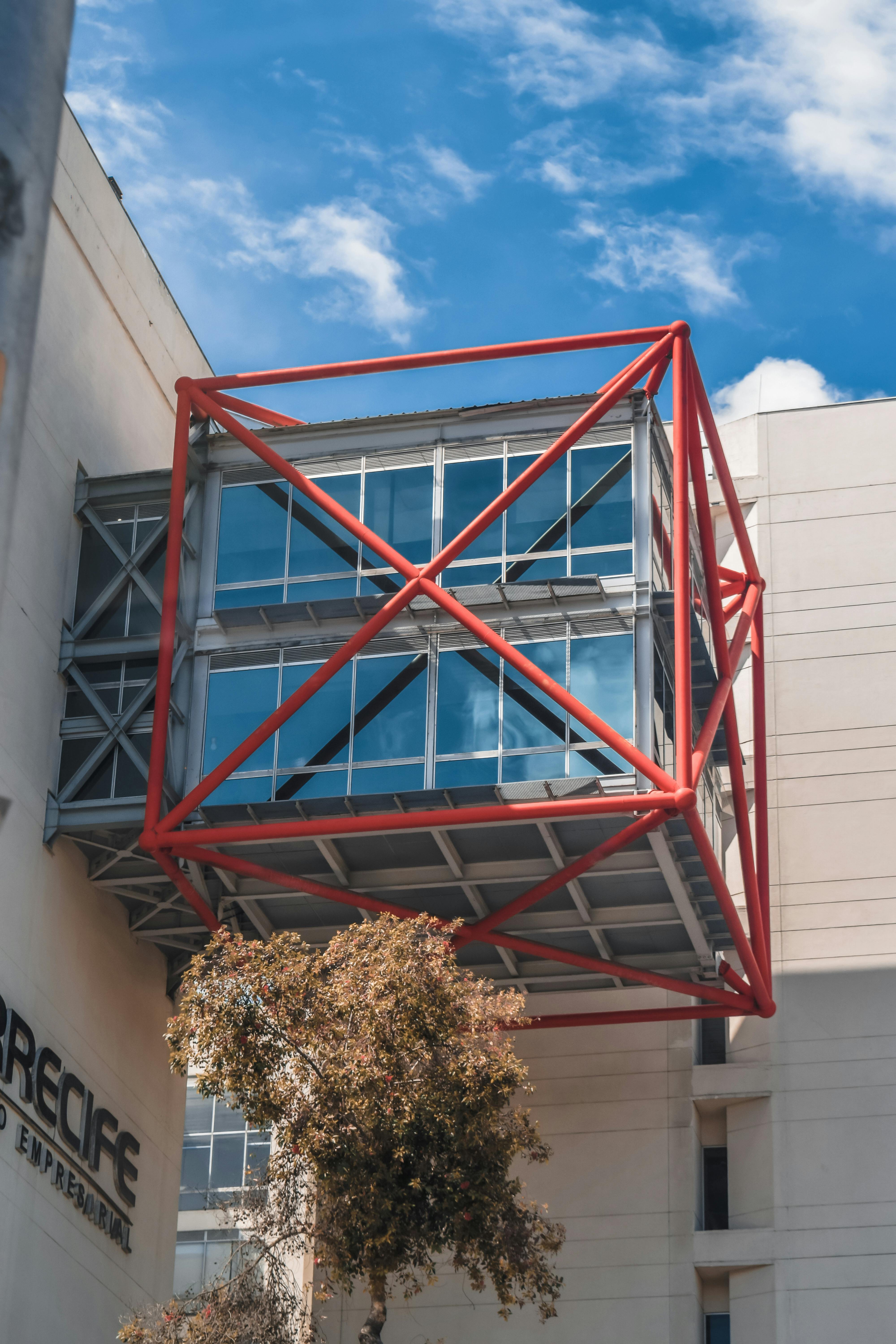 Red Metal Frame on Glass Window · Free Stock Photo