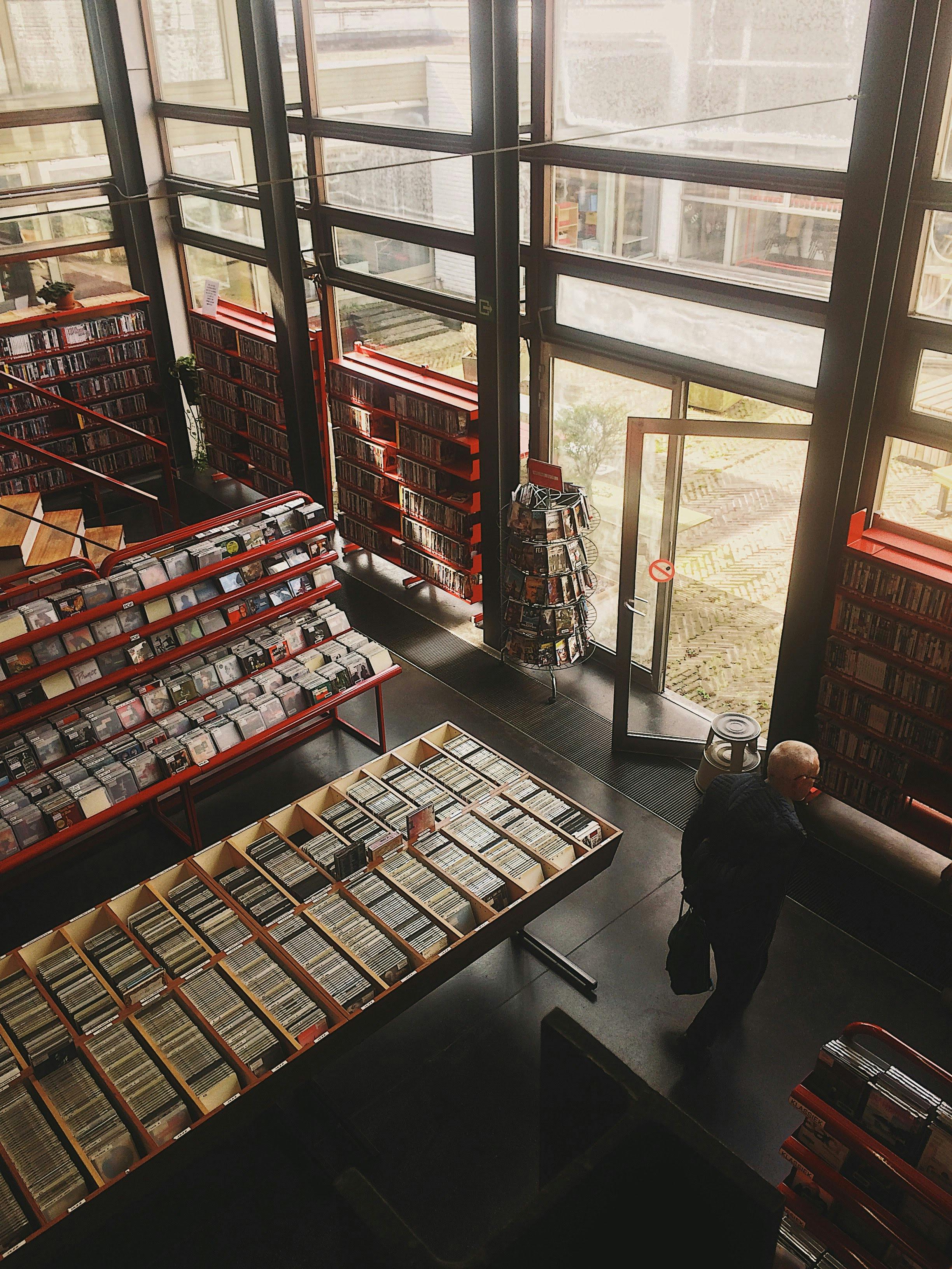CD Boxes on Shelves in Music Store · Free Stock Photo