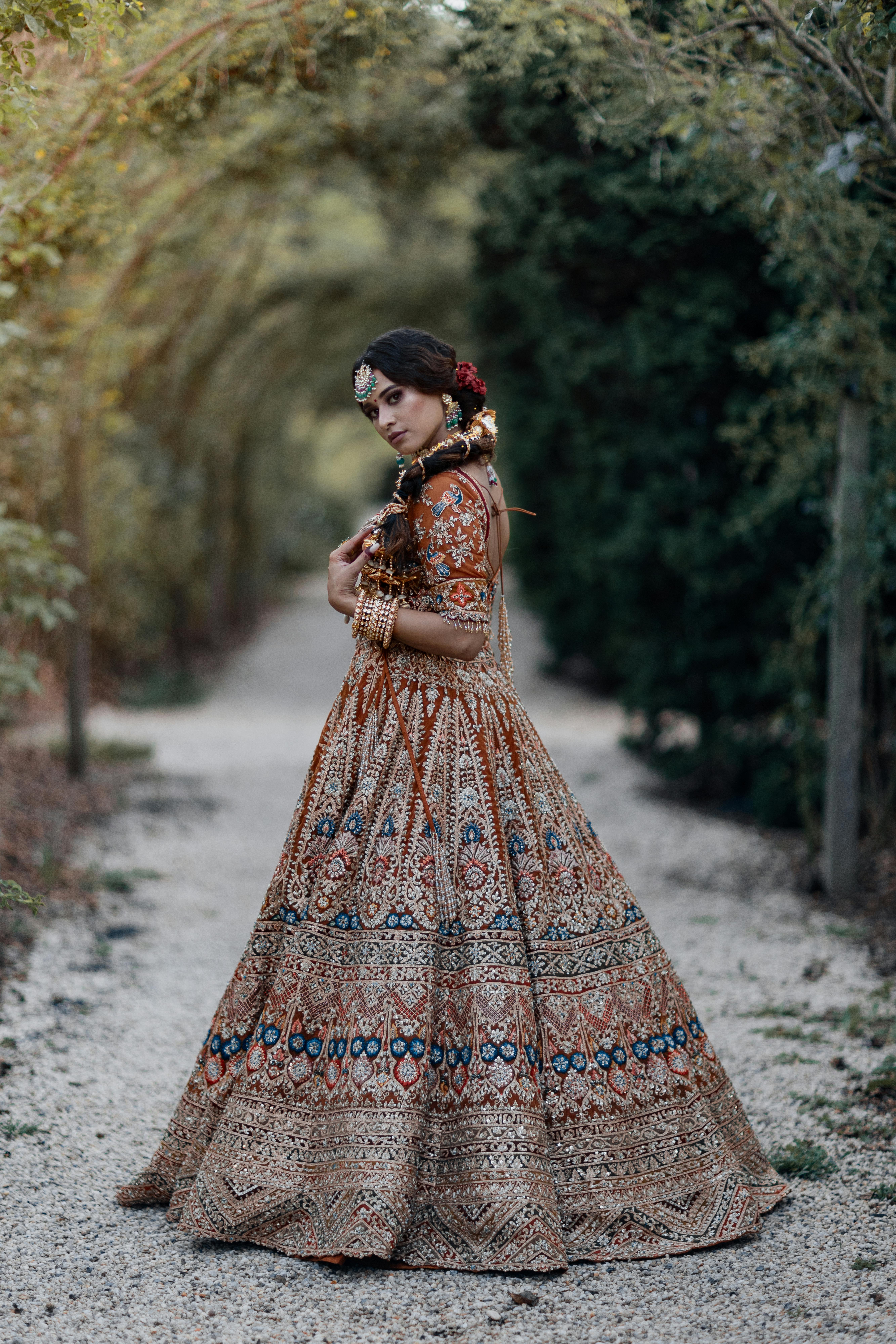 Woman Wearing a Long Traditional Ornamented Dress · Free Stock Photo