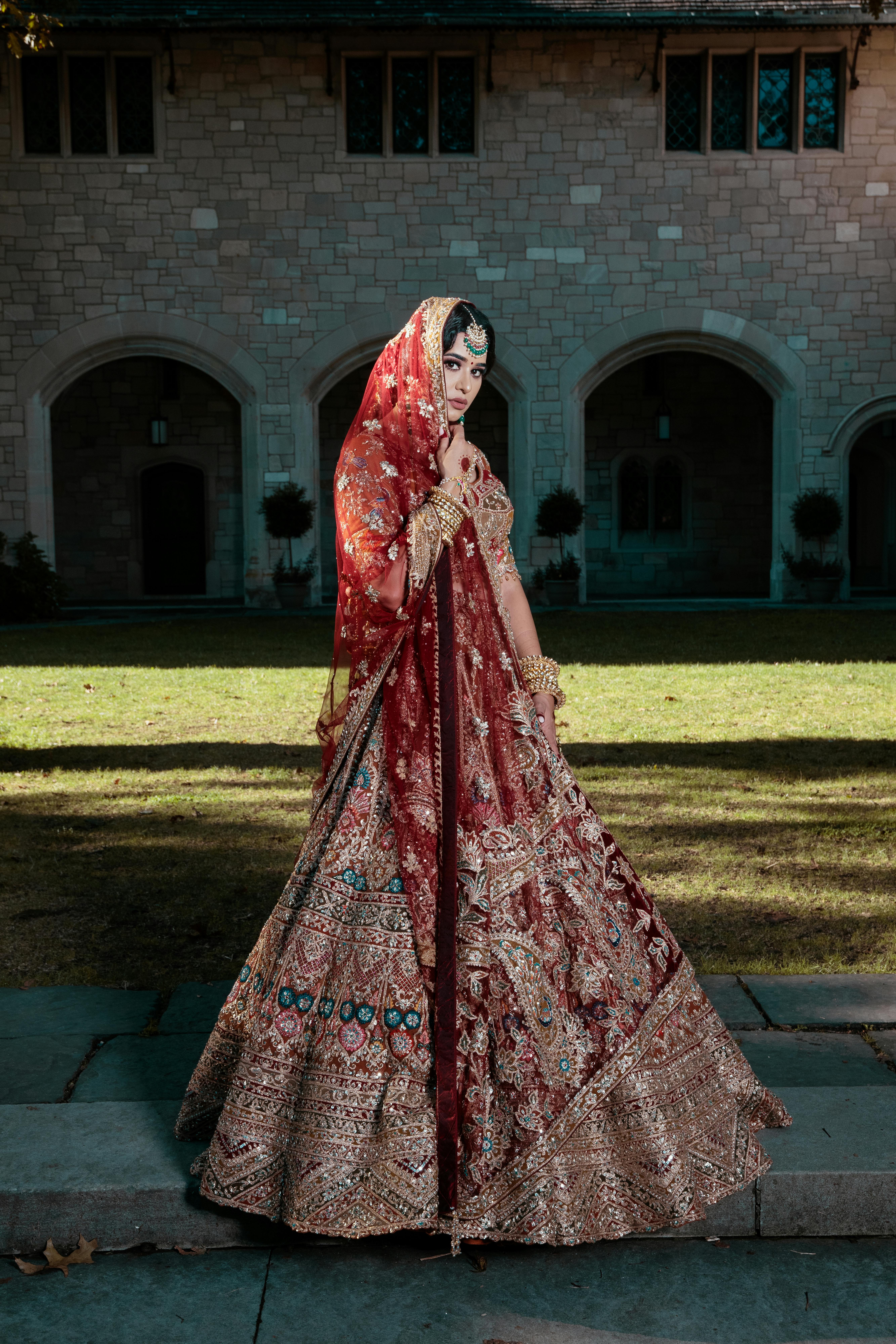 A Woman Wearing a Traditional Dress · Free Stock Photo