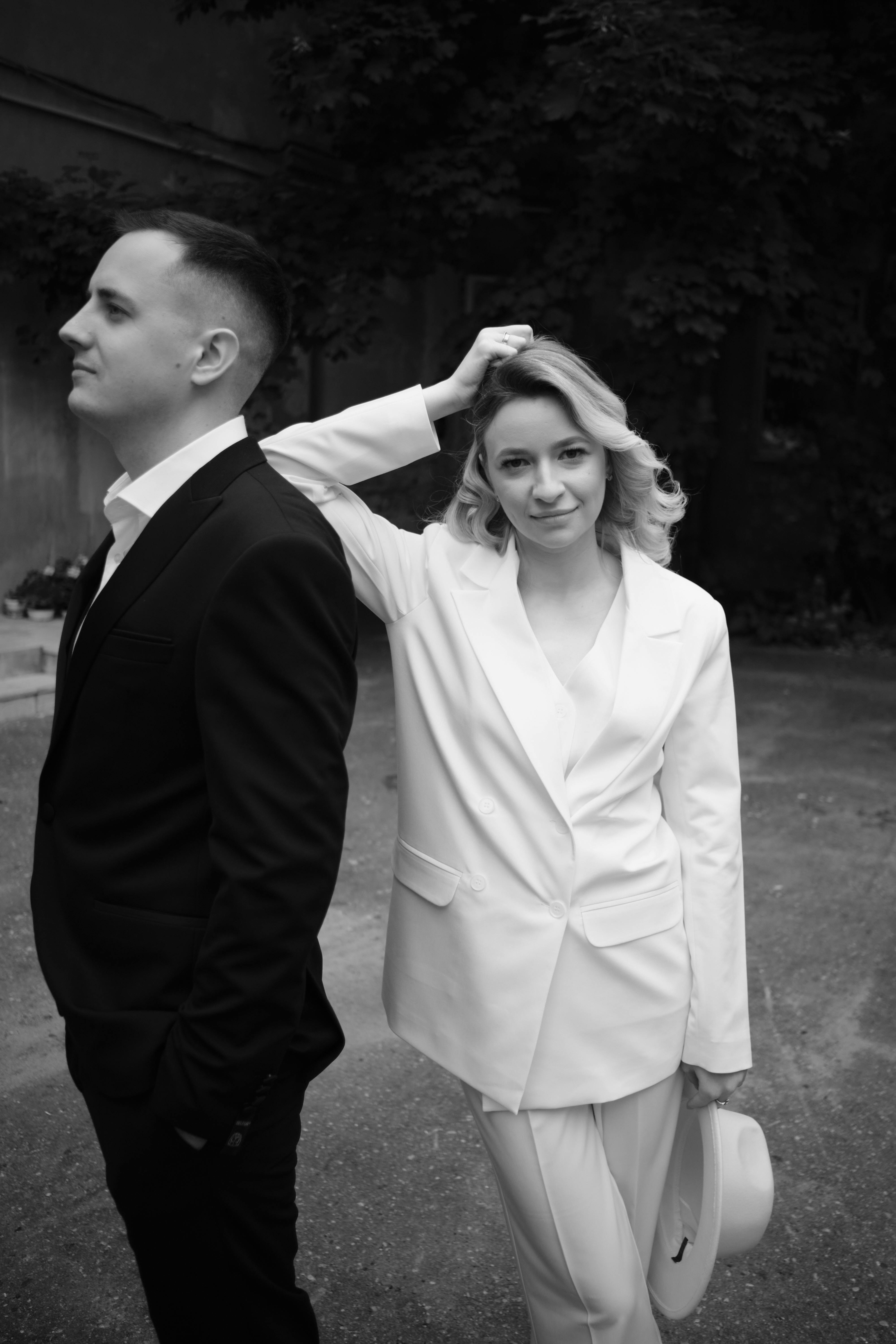 Grayscale Photo of Men Wearing Suit Jacket · Free Stock Photo