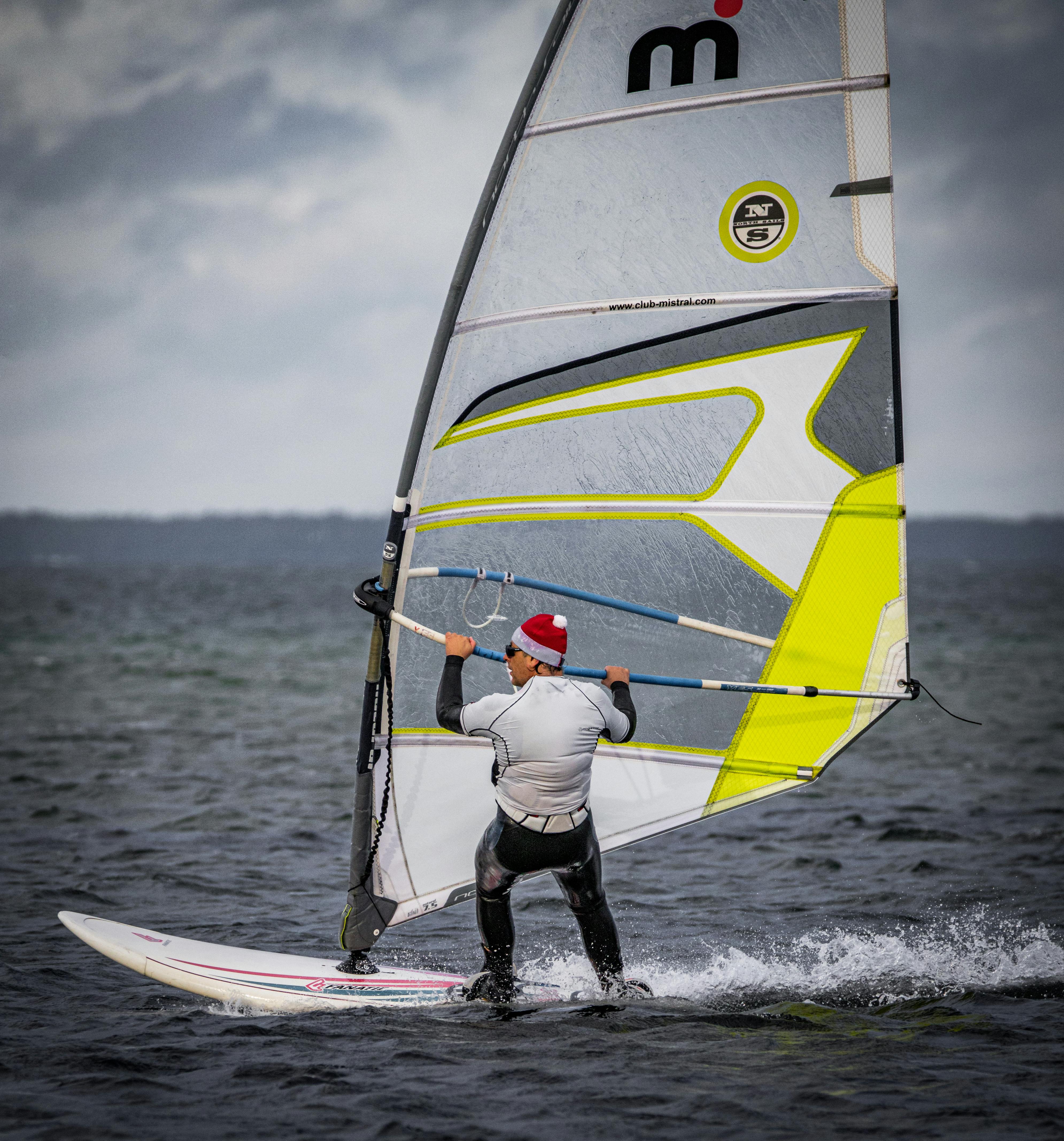 A Person Windsurfing on Sea · Free Stock Photo