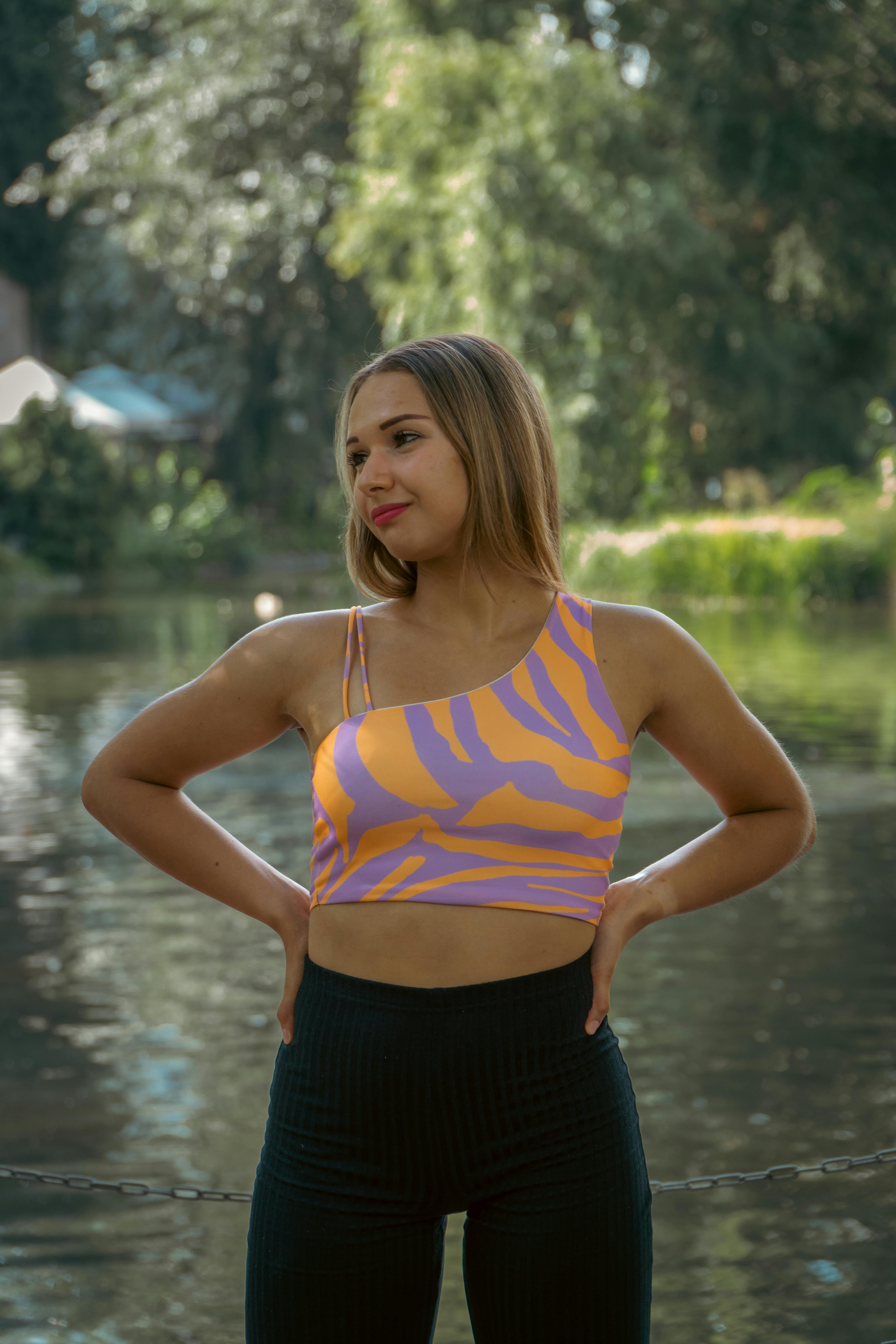 Woman with Body Tattoo Wearing Black Crop Top · Free Stock Photo