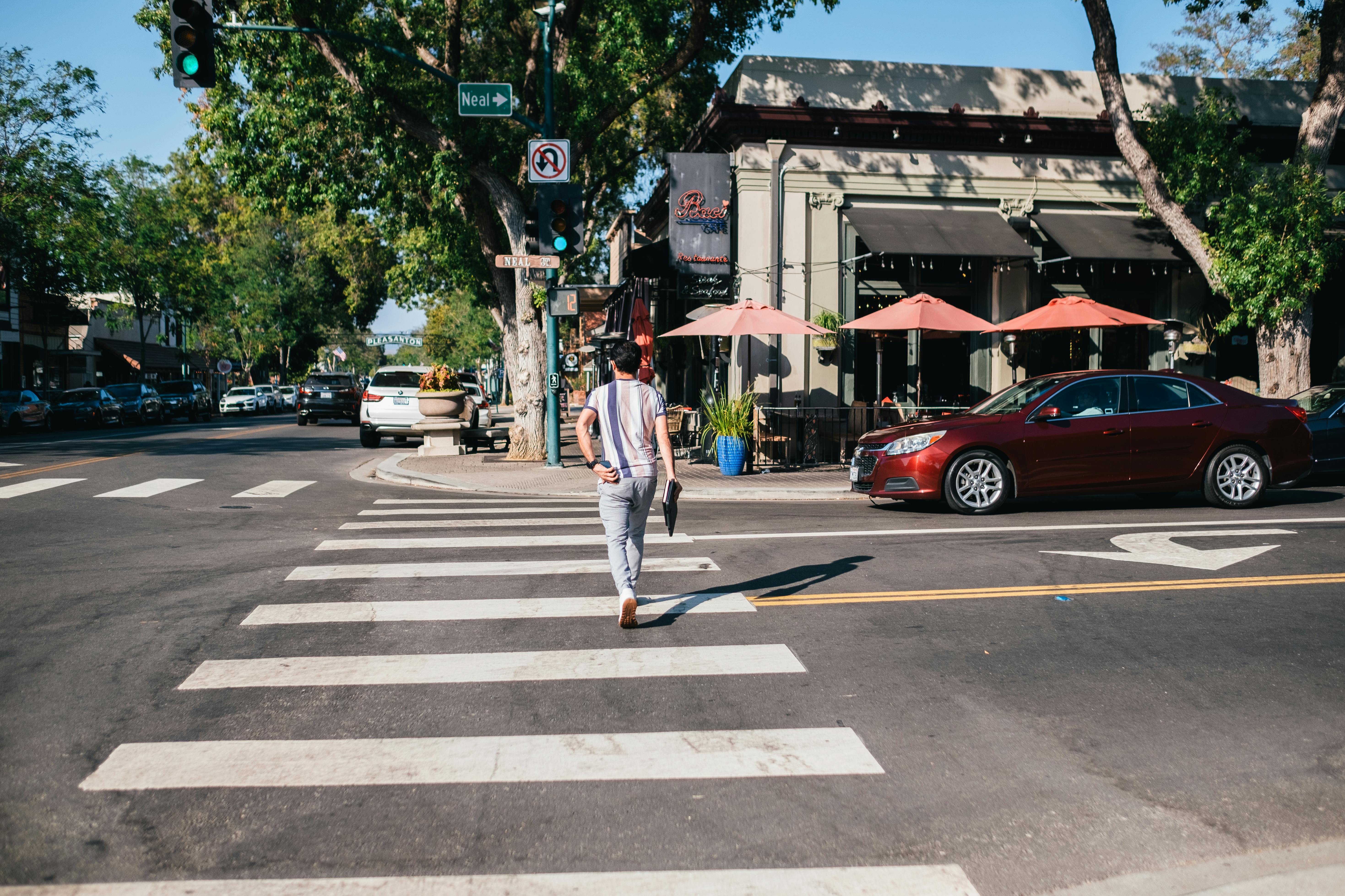 Man on Pedestrian Crossing · Free Stock Photo