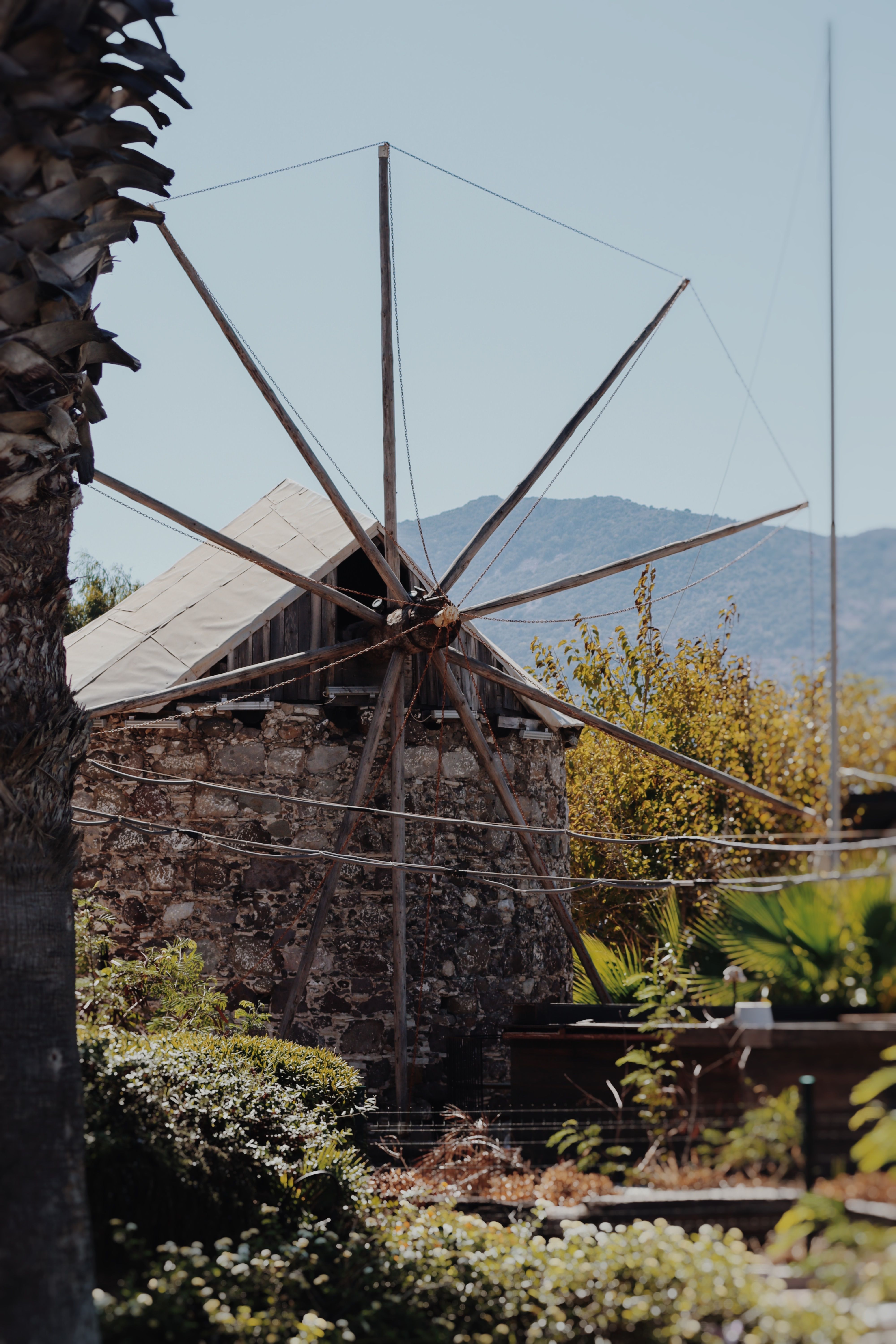 Brown Wooden Windmill Under the Blue Sky · Free Stock Photo