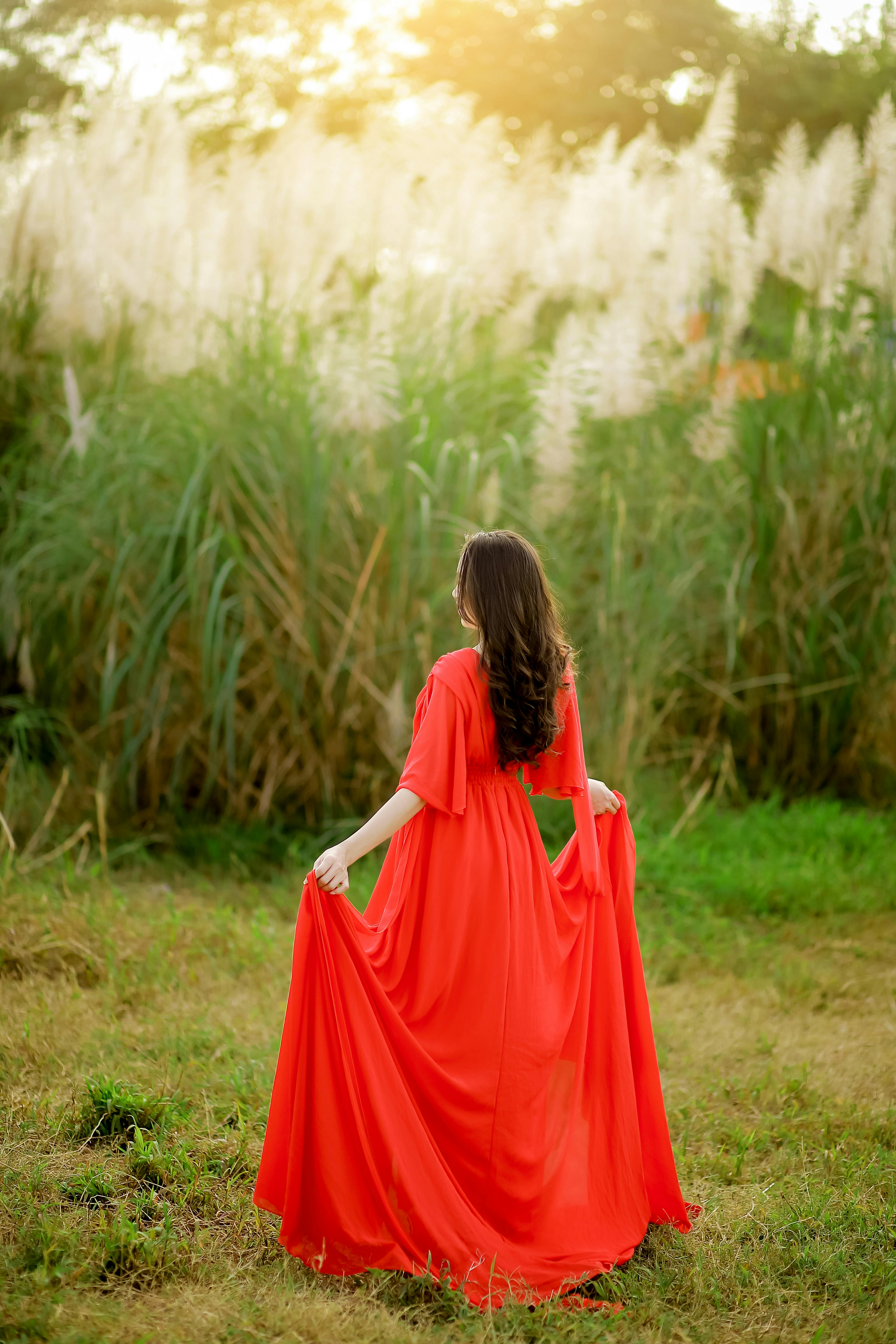 A Person in Red Dress · Free Stock Photo