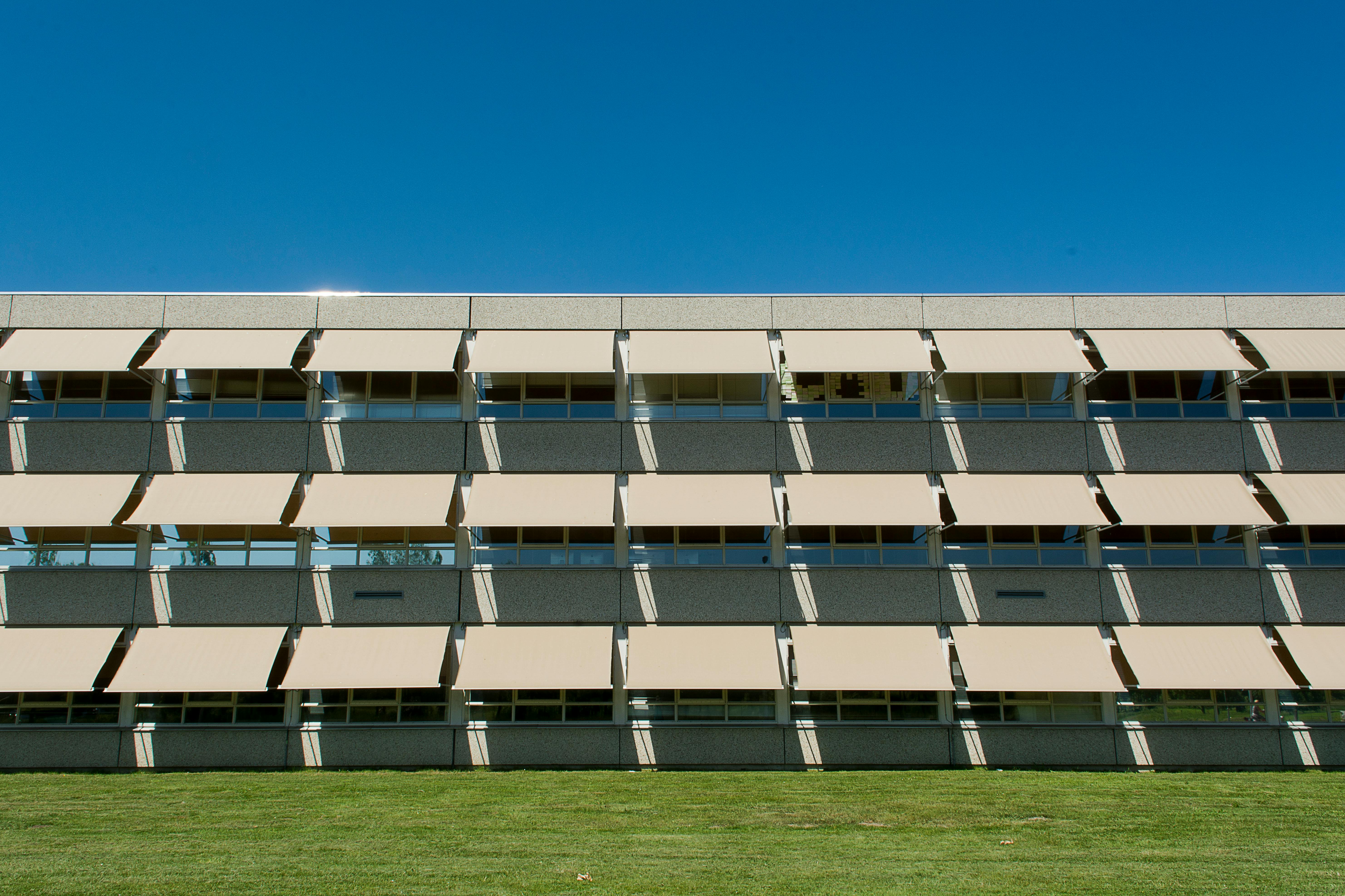 Facade of a Concrete Building · Free Stock Photo