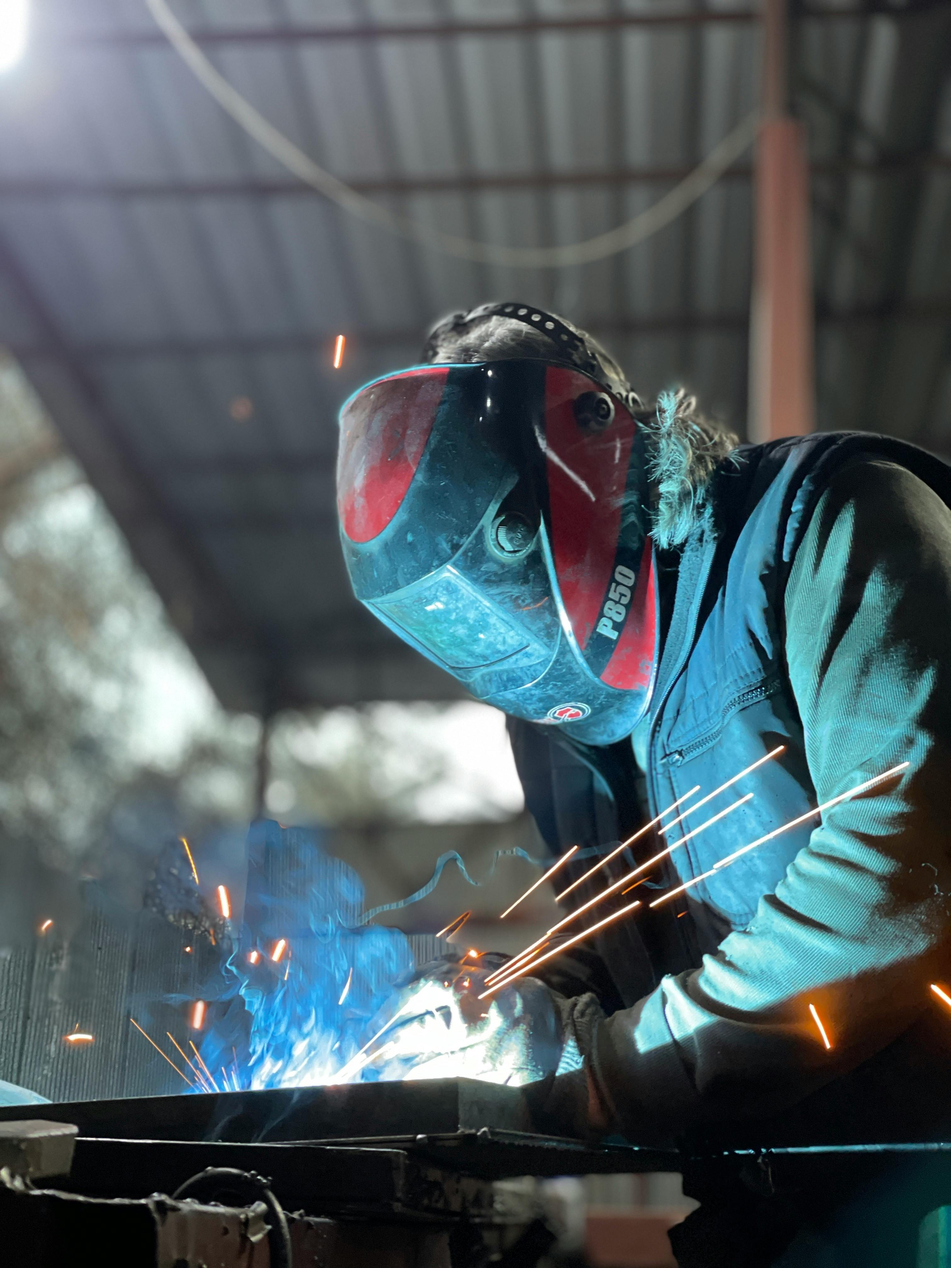 Male Welder at Work · Free Stock Photo