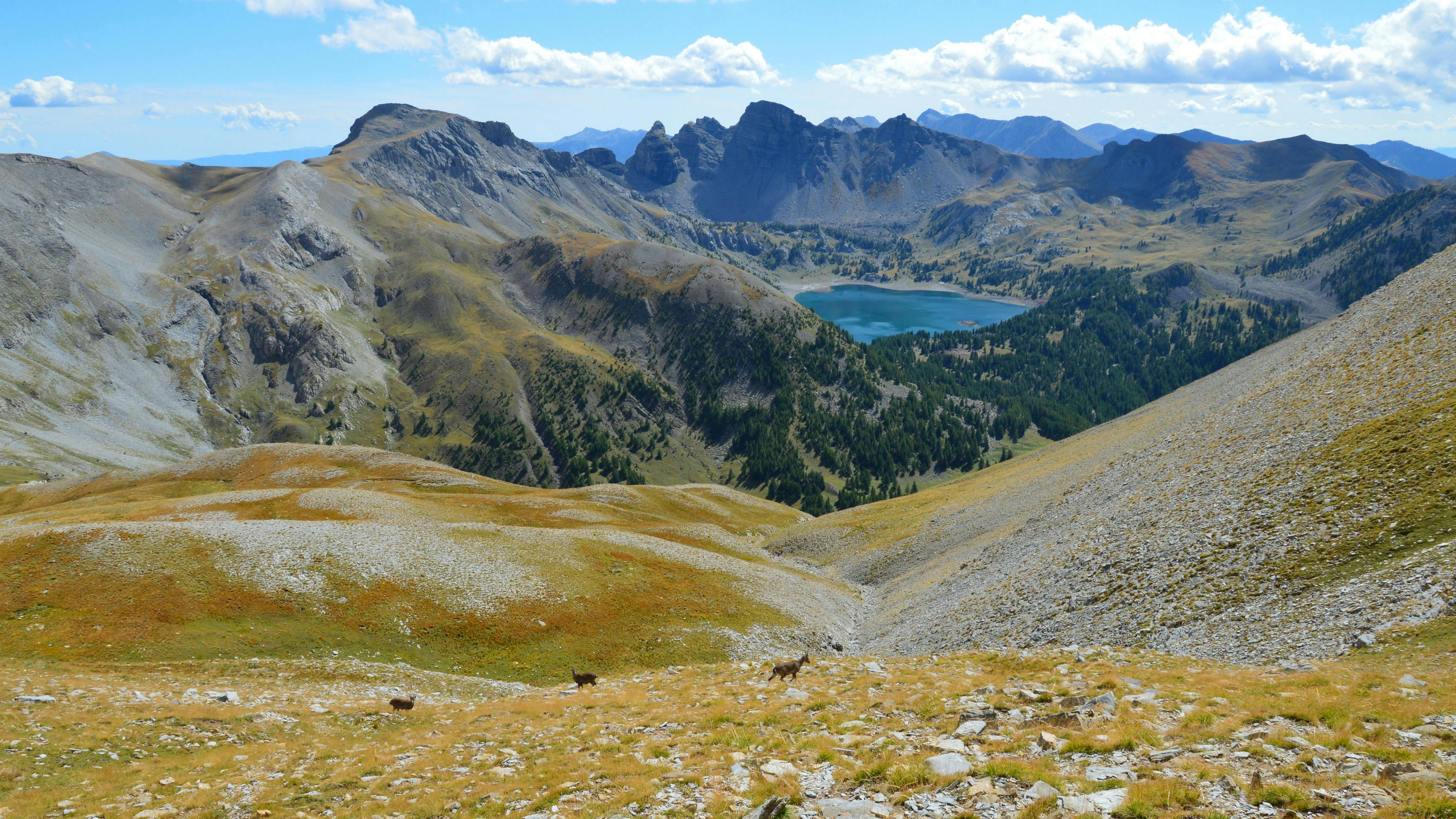 Mountain Ranges Around a Lake · Free Stock Photo