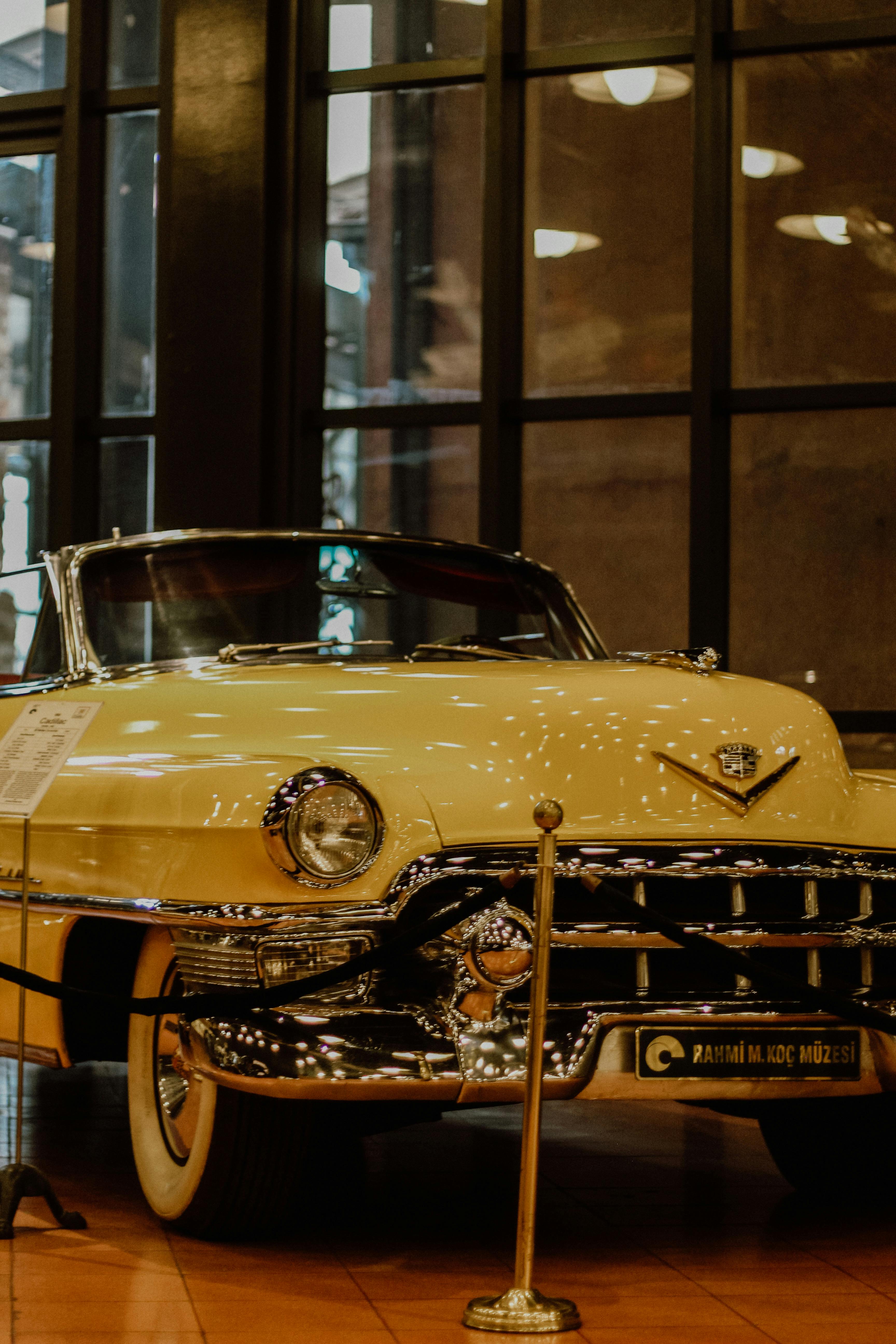 Yellow Vintage Car Inside a Museum · Free Stock Photo