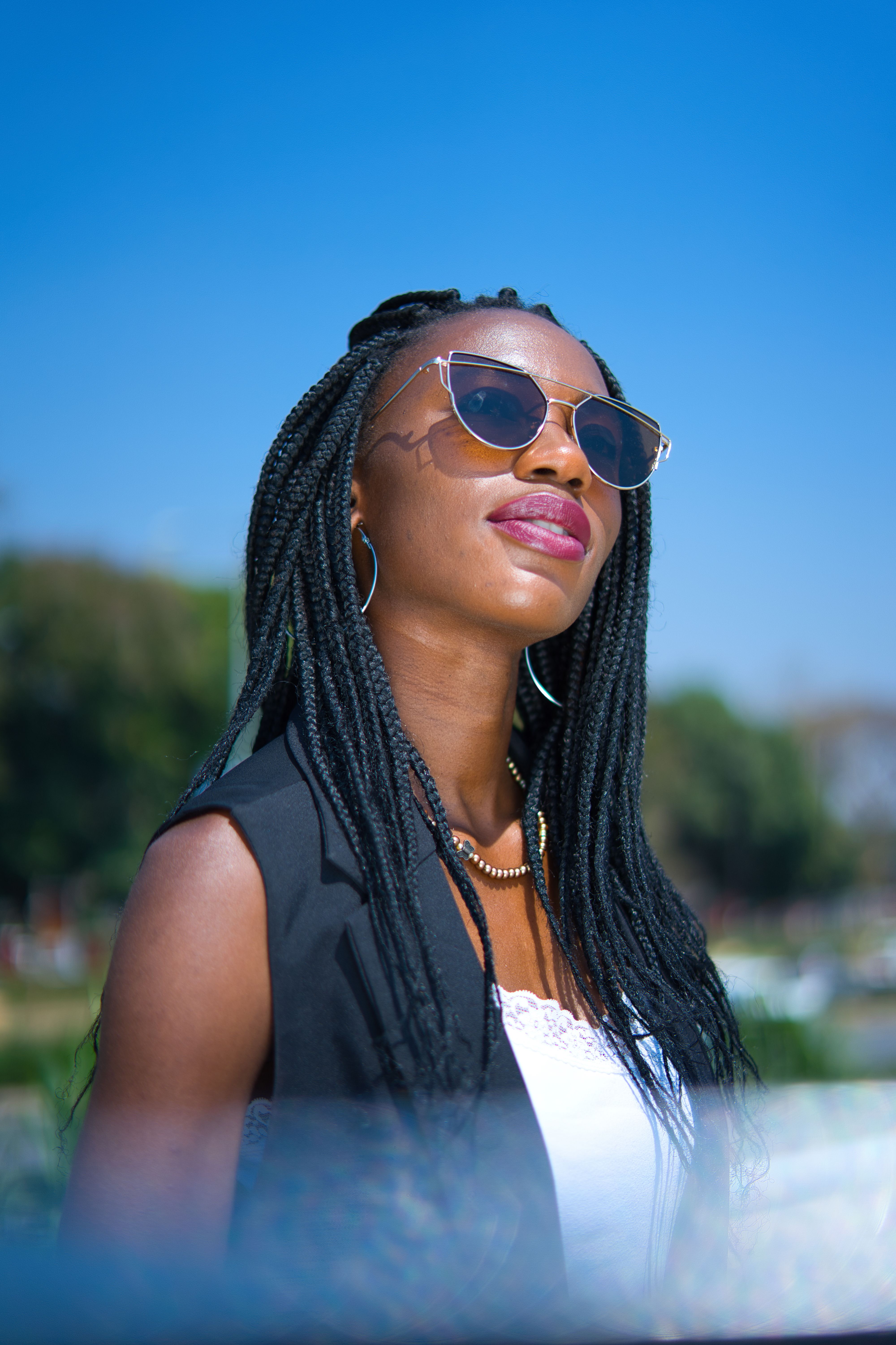 A Woman Wearing Sunglasses · Free Stock Photo