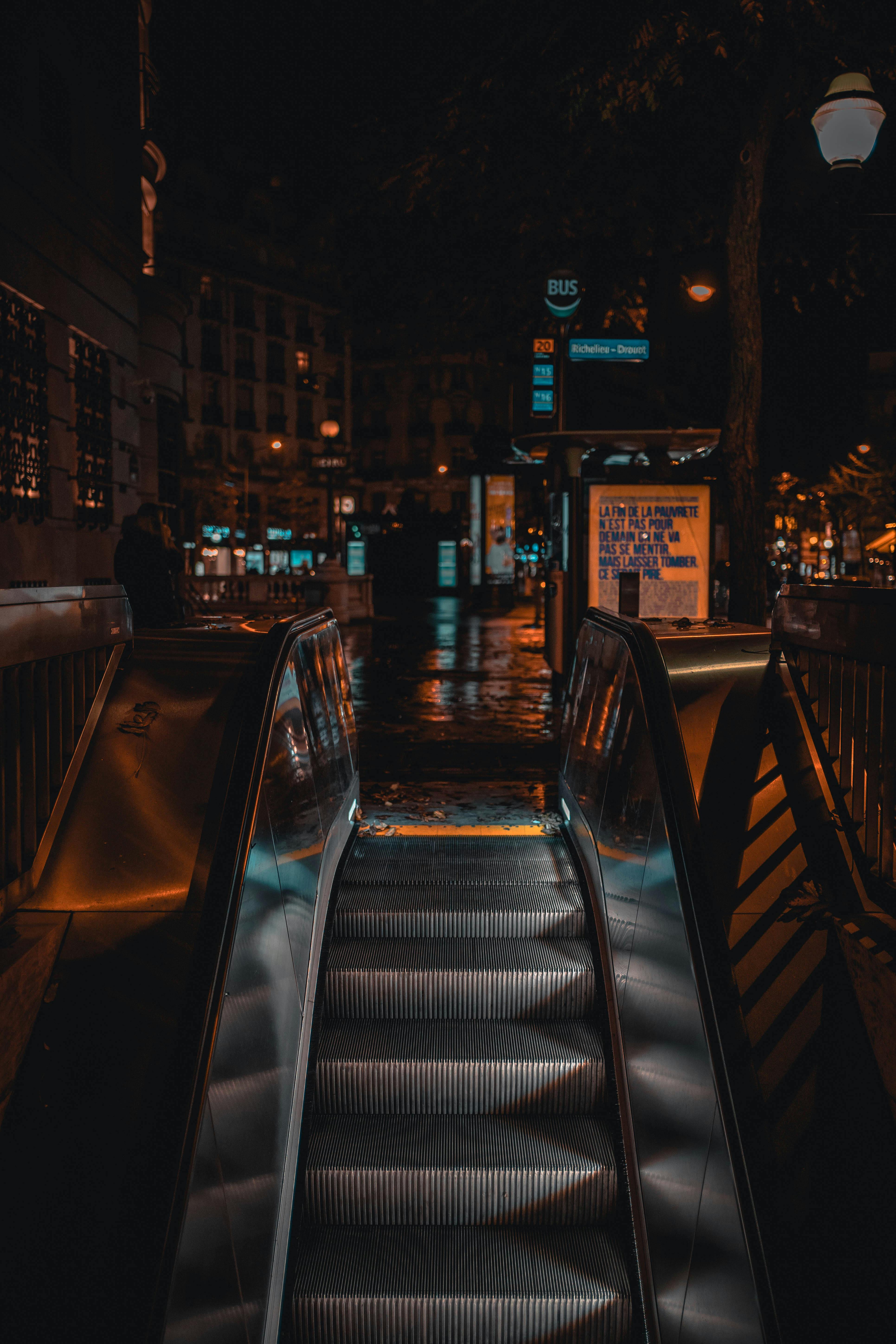 Gray Escalator on Street during Night Time · Free Stock Photo