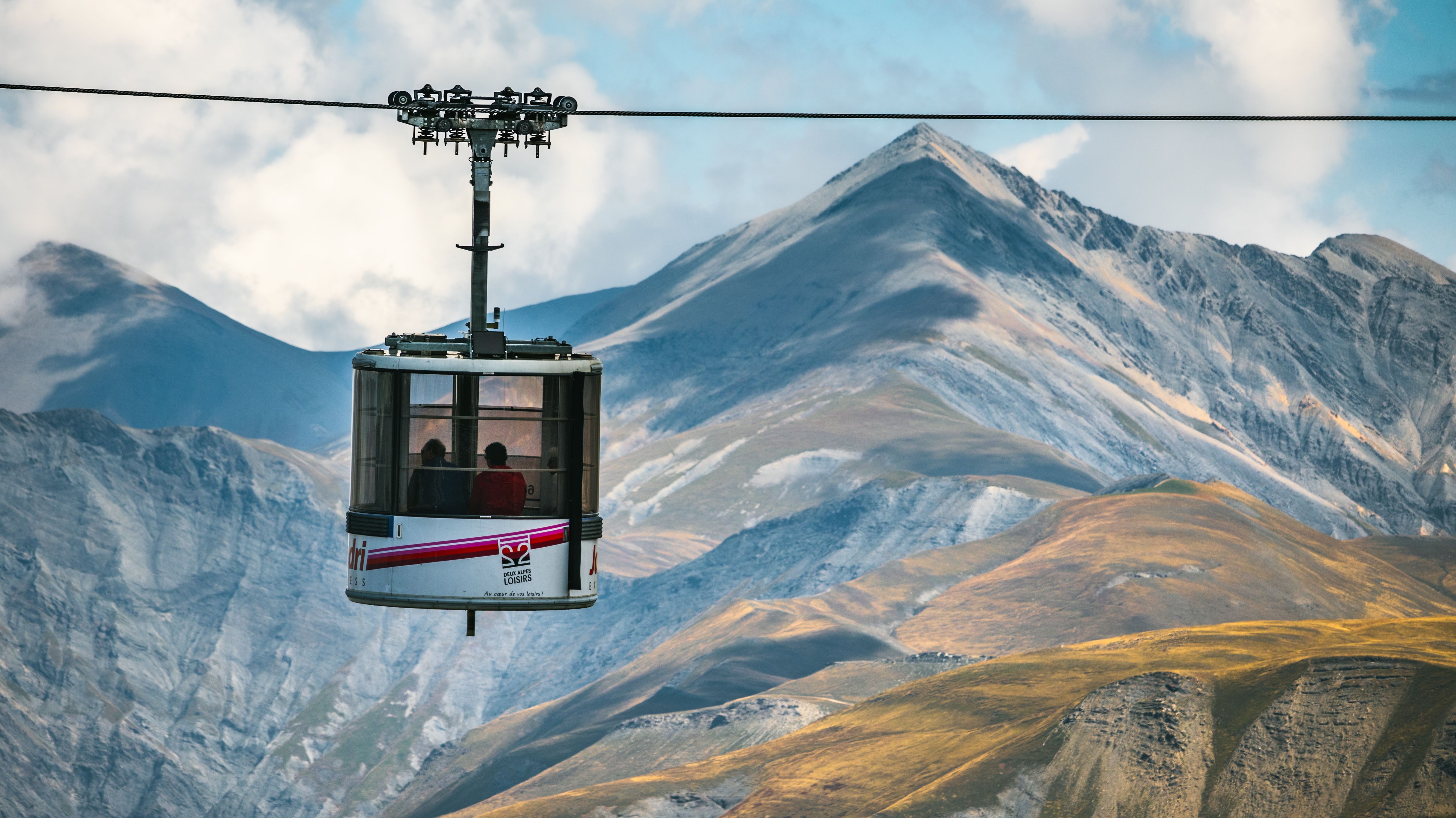 Black and Red Cable Car over Snow Covered Mountain · Free Stock Photo