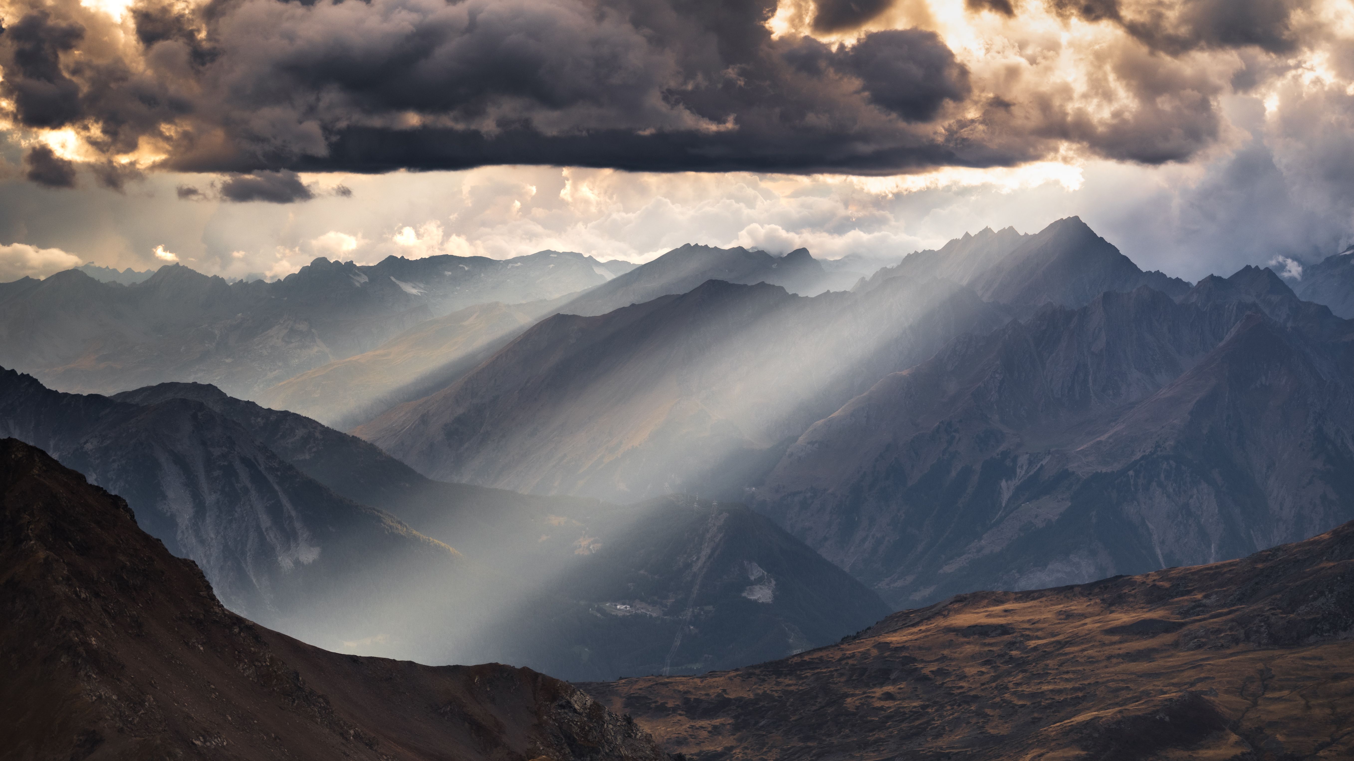 Aerial Photography of Lake between Mountains under the Cloudy Sky ...
