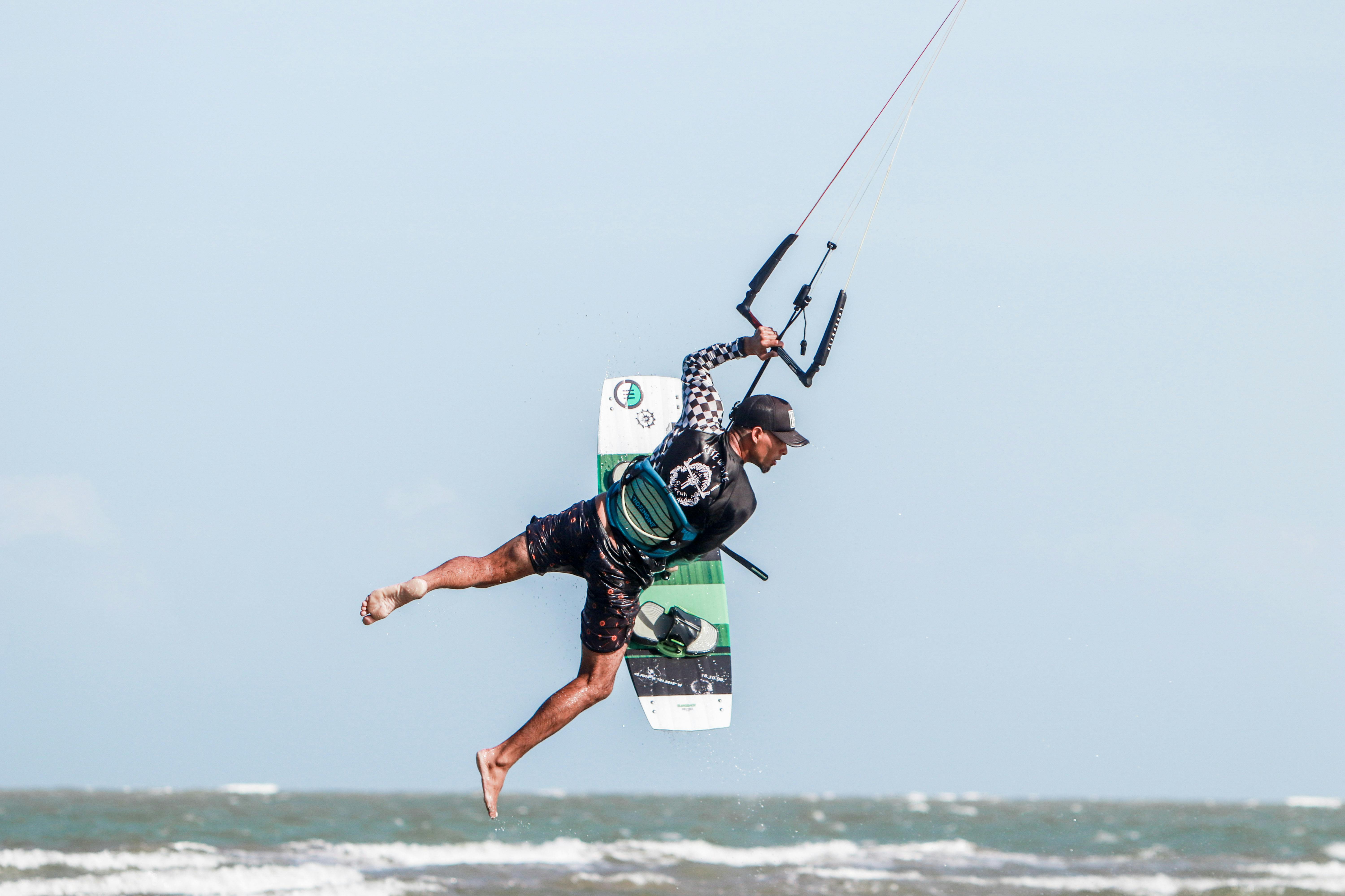 Person Jumping a Wakeboard on the Lake · Free Stock Photo