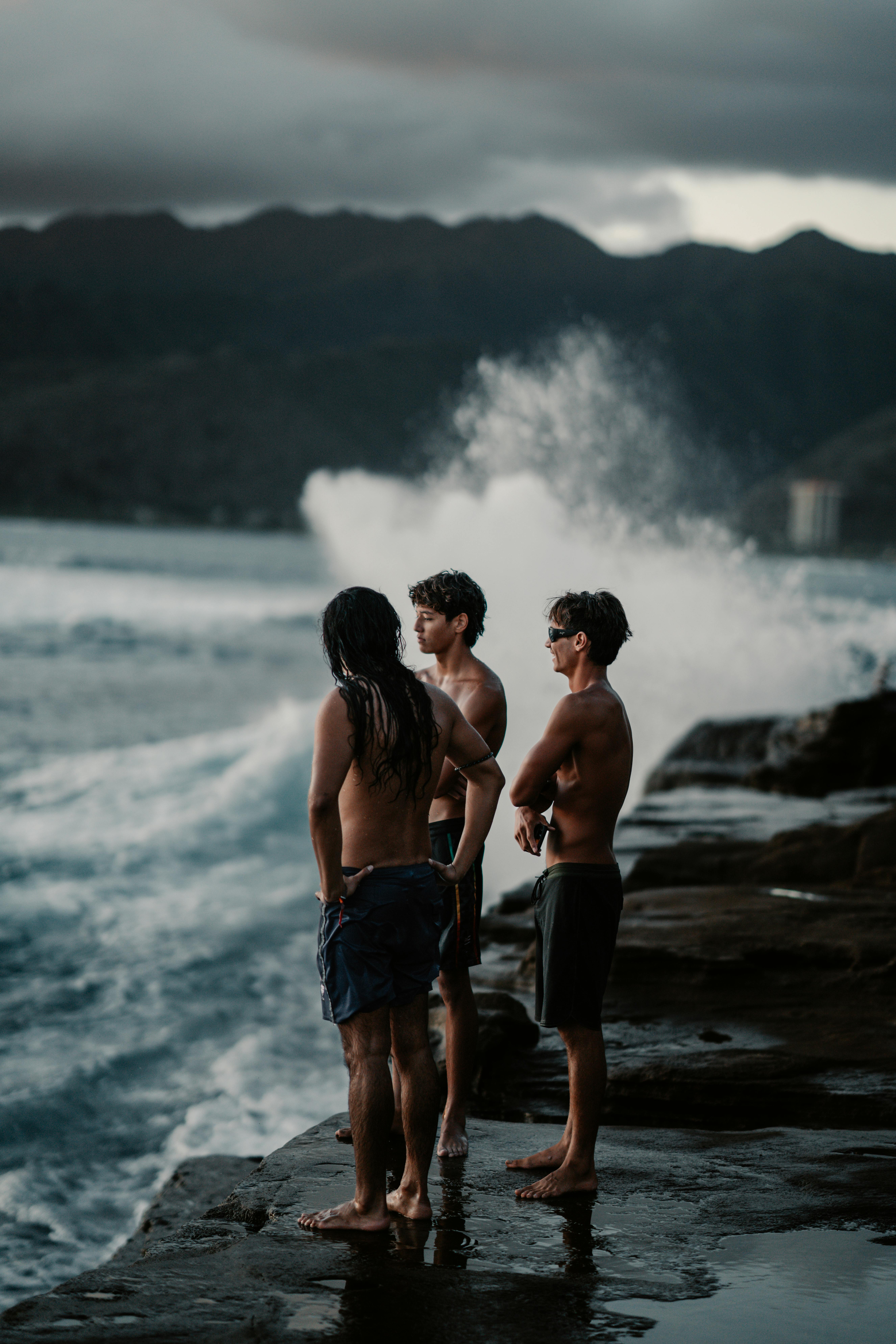 Group of Young Men Standing on the Beach · Free Stock Photo