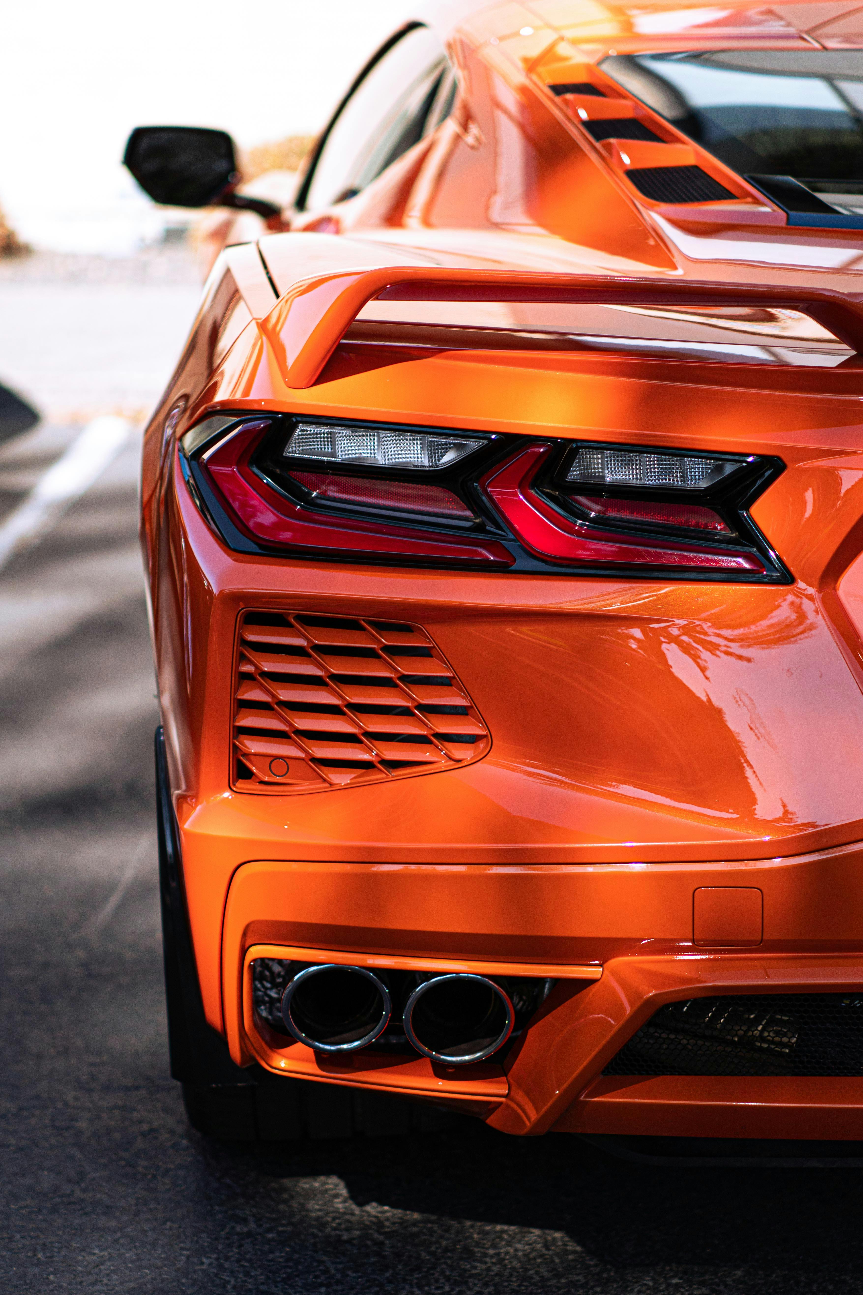 Orange Car with Red Taillight · Free Stock Photo