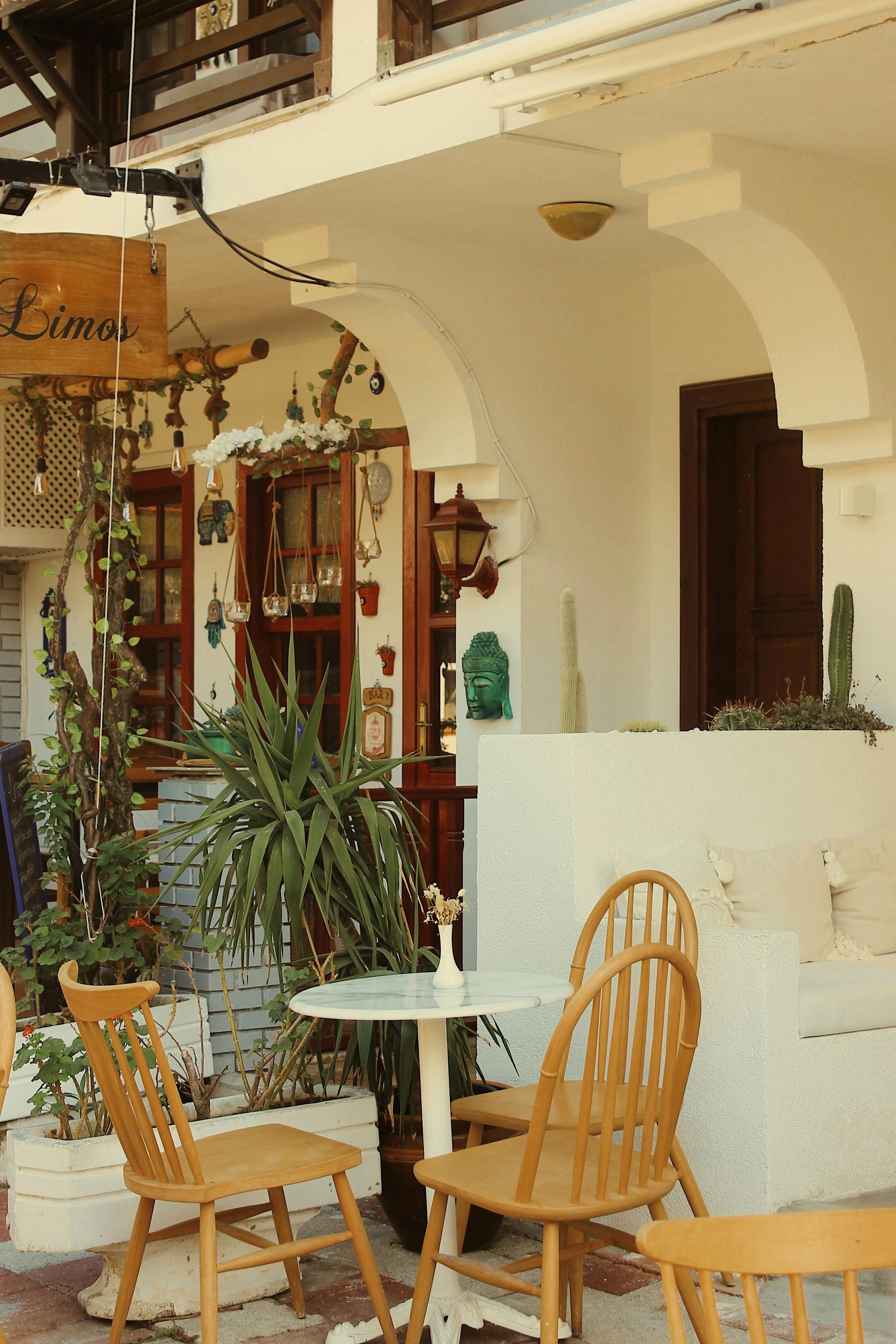 Wooden Chairs In Front of a Coffee Shop · Free Stock Photo