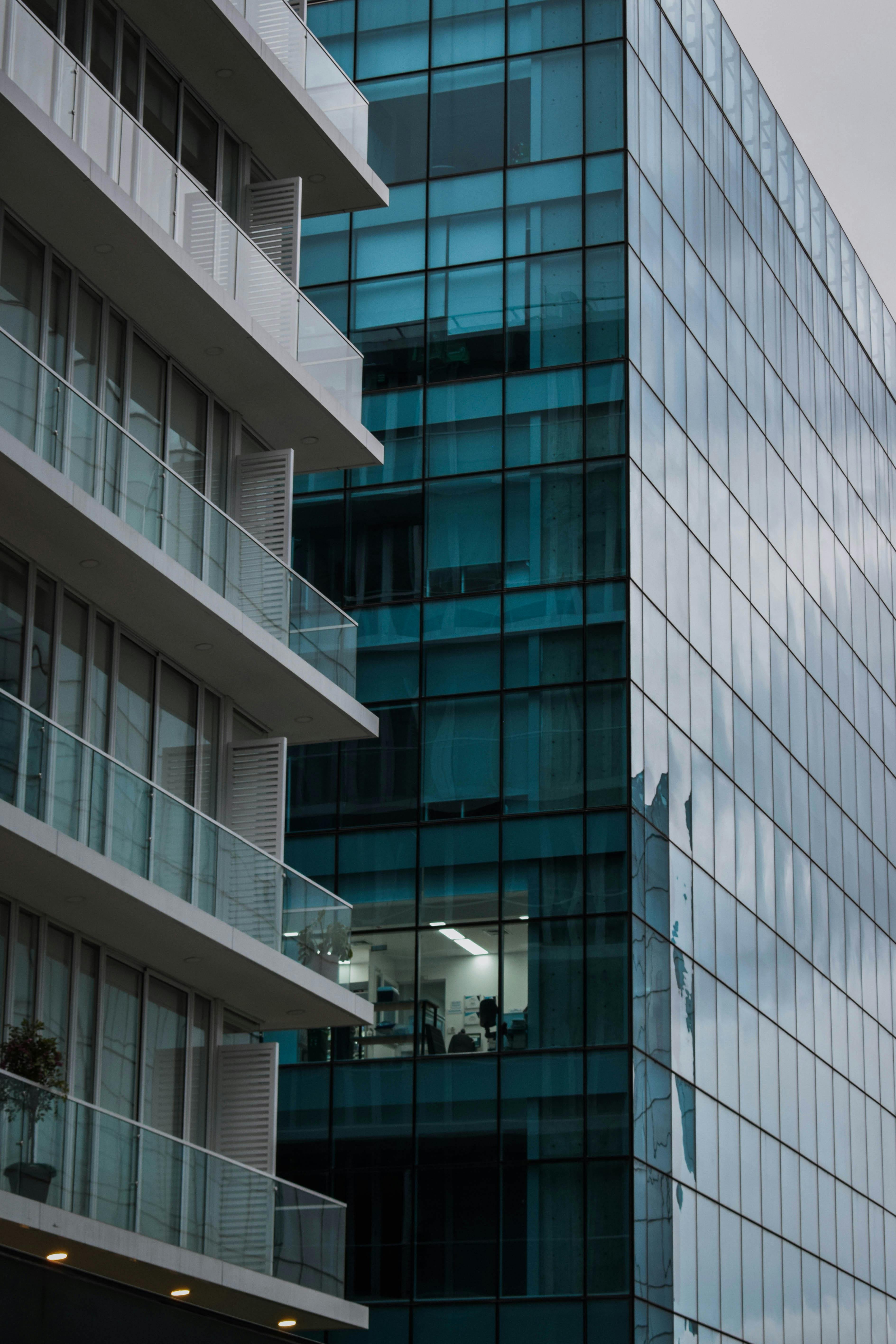 Balconies of a High Rise Apartment Building · Free Stock Photo