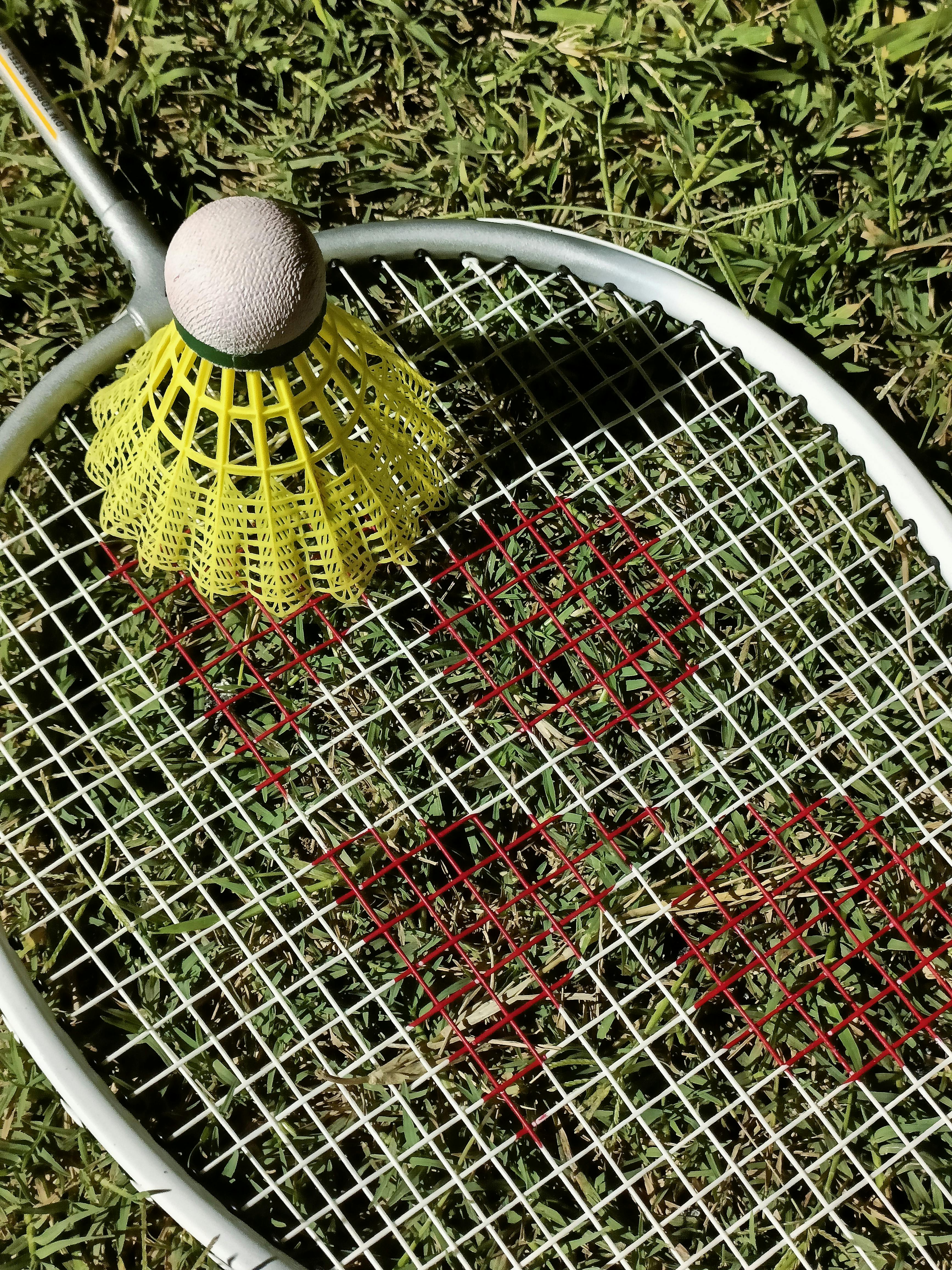 Green and White Court with Badminton Rackets · Free Stock Photo