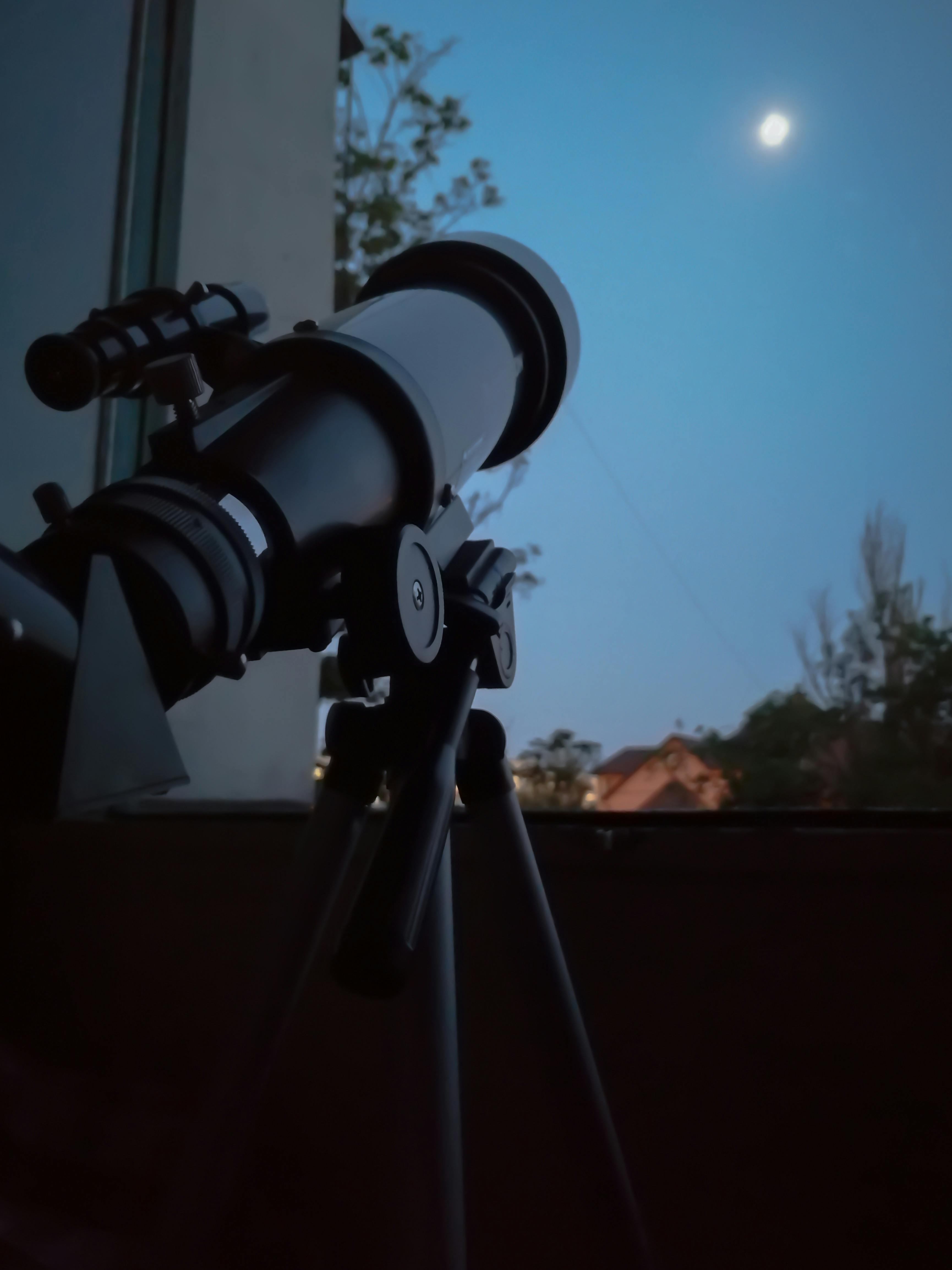 A Telescope Near the Window · Free Stock Photo