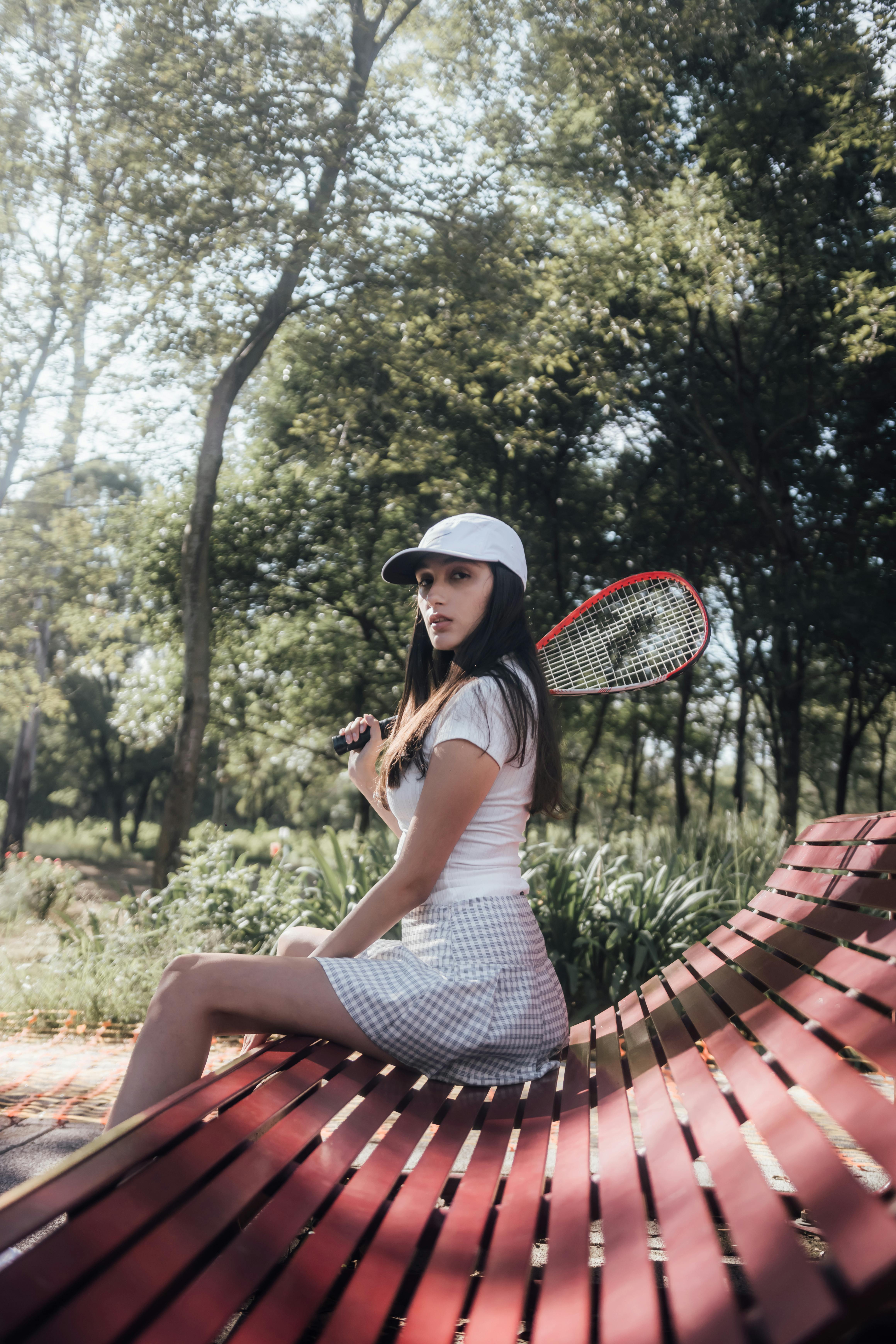 Woman Sitting on a Bench · Free Stock Photo
