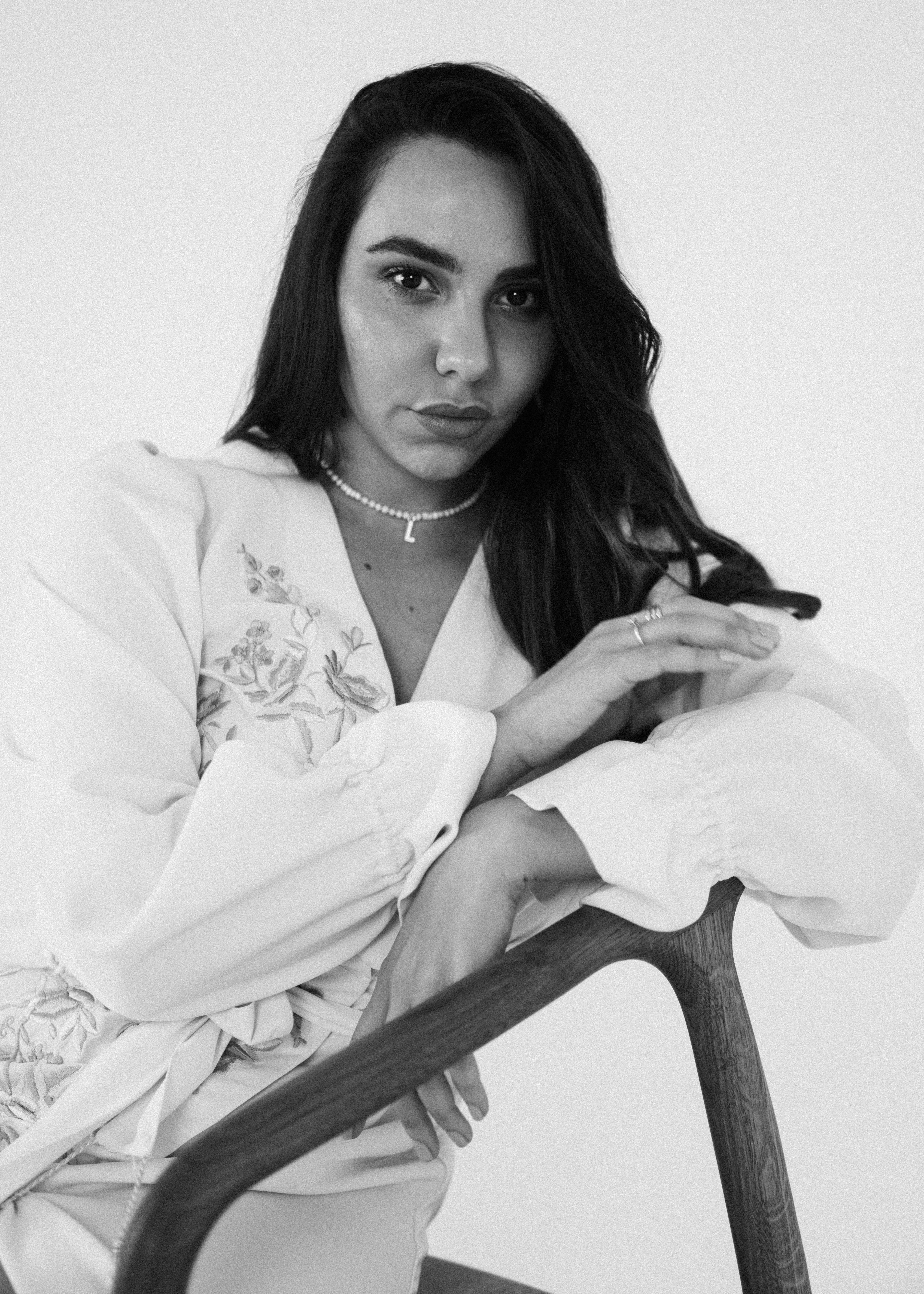 Grayscale Photo of a Beautiful Woman Posing · Free Stock Photo