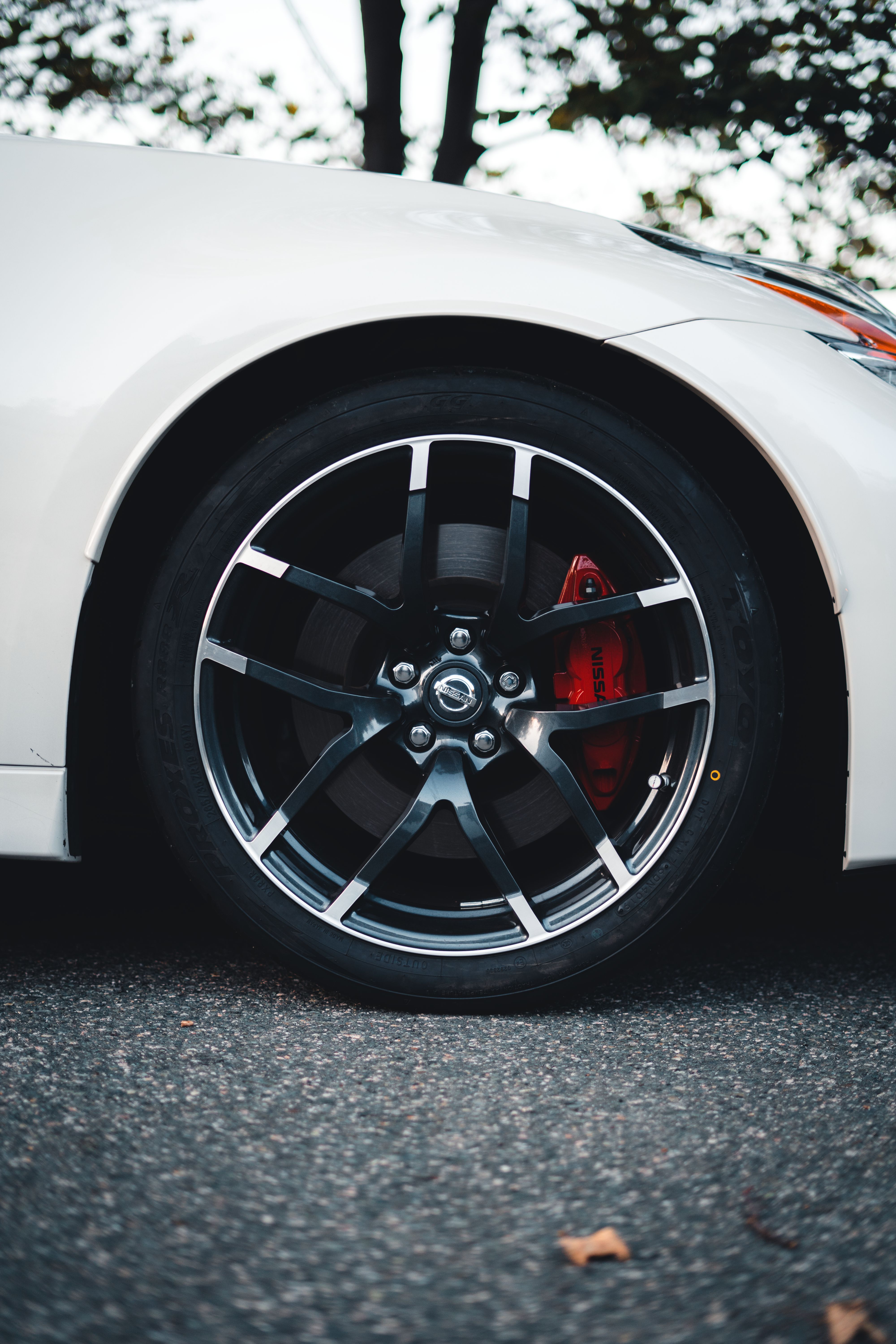 Photography of Red Car On Asphalt Road · Free Stock Photo