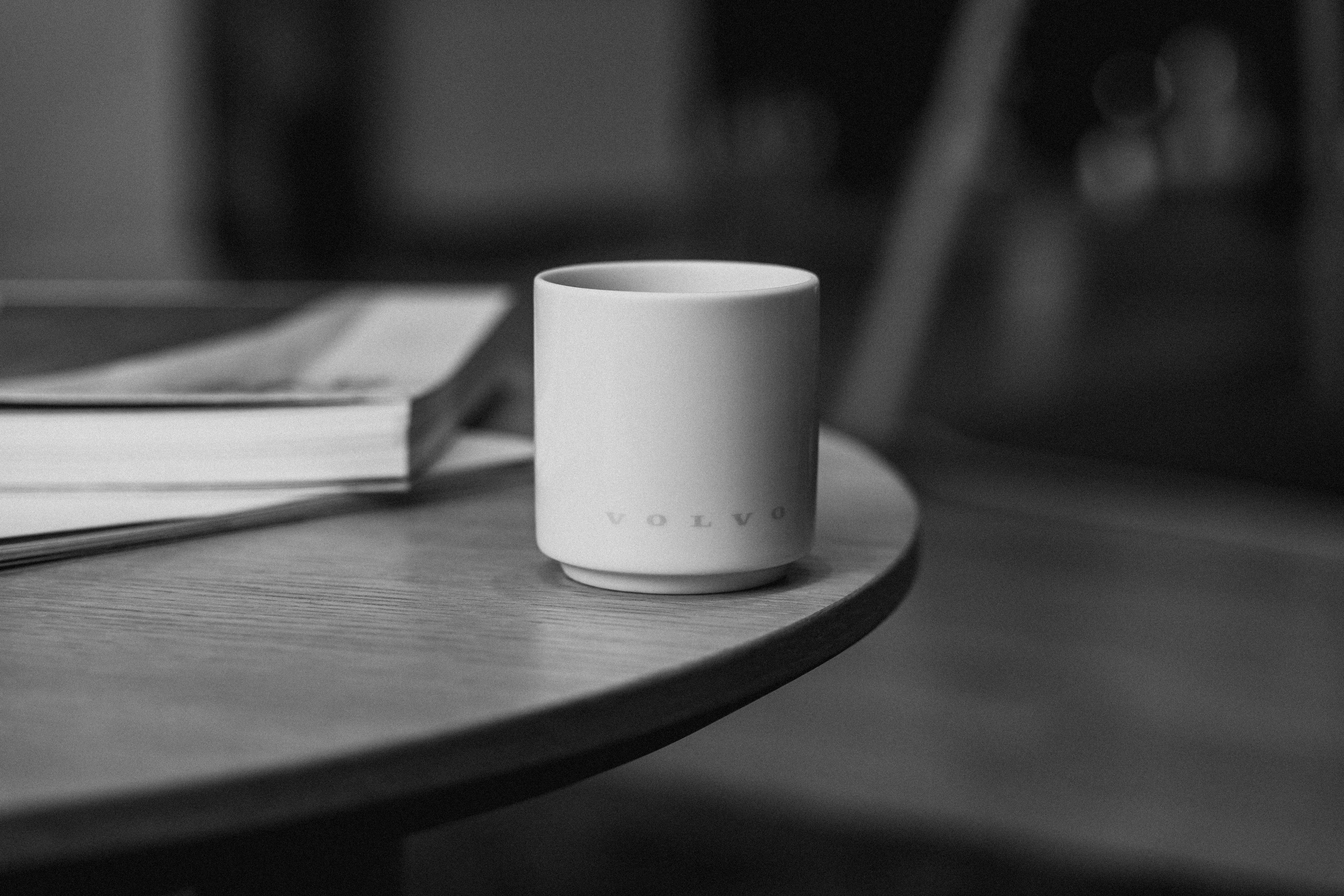 Grayscale Photo of a Volvo Cup · Free Stock Photo