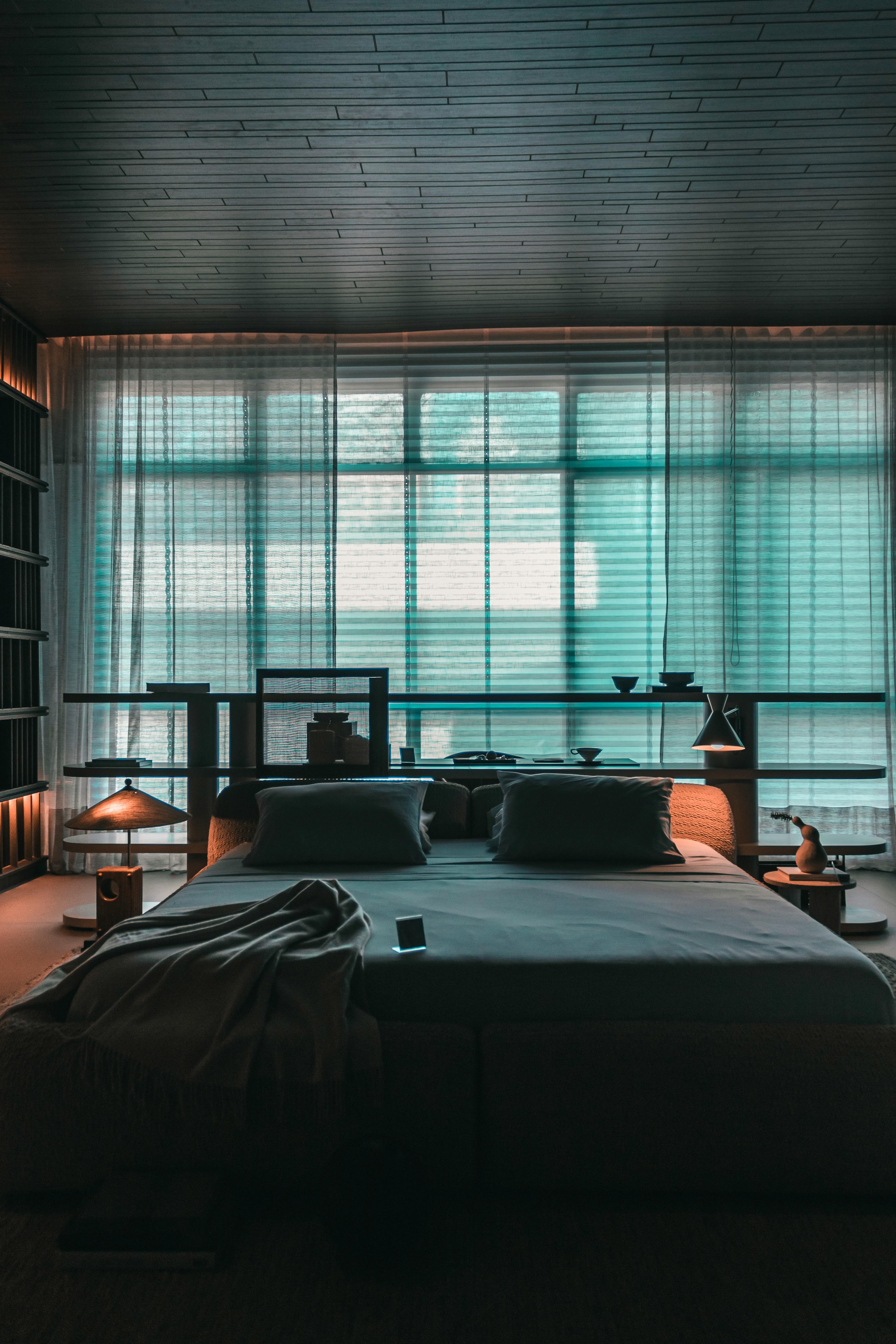 Black Laptop Computer On A Bed · Free Stock Photo