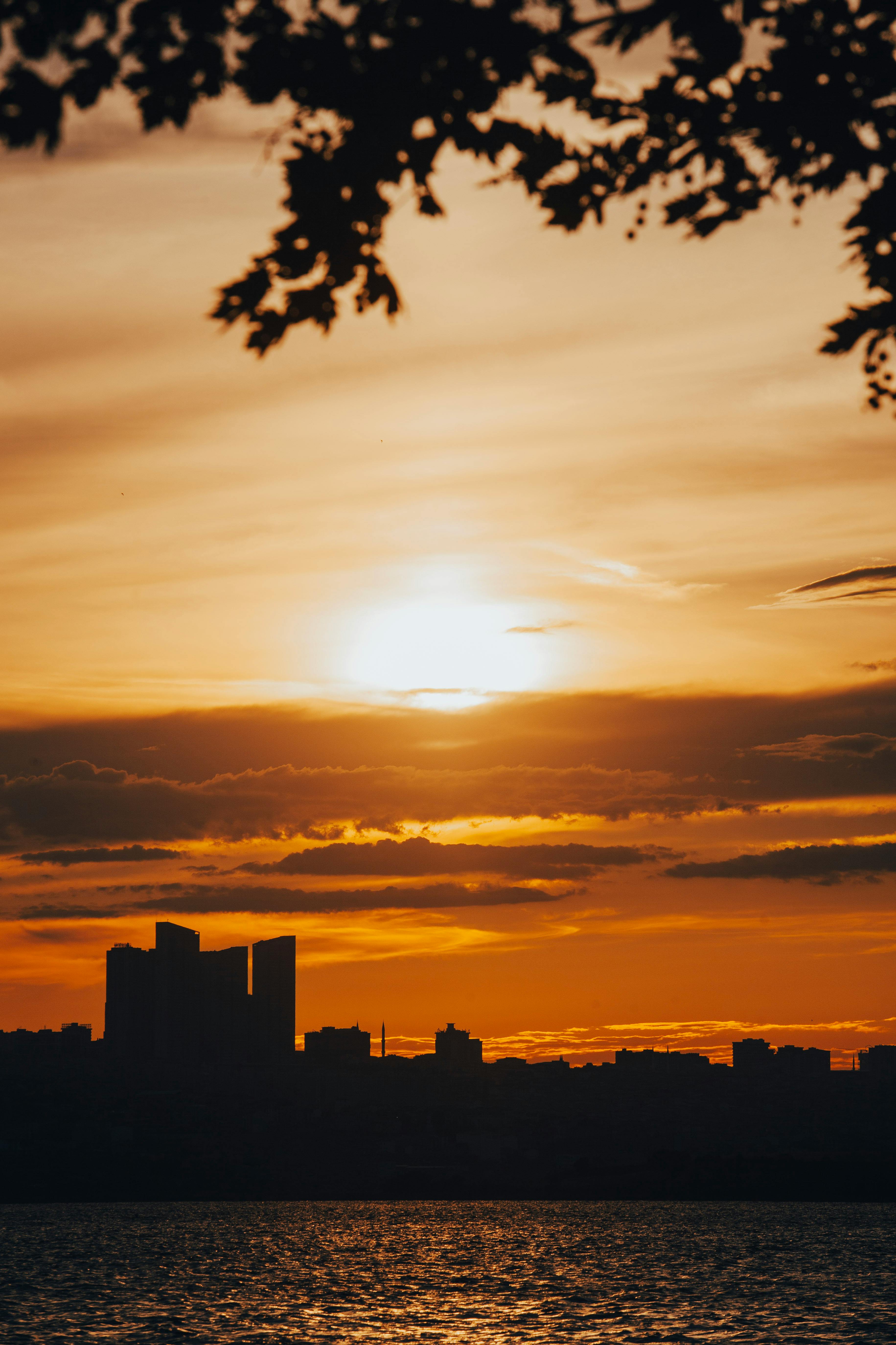 Silhouette of Buildings during Sunset · Free Stock Photo