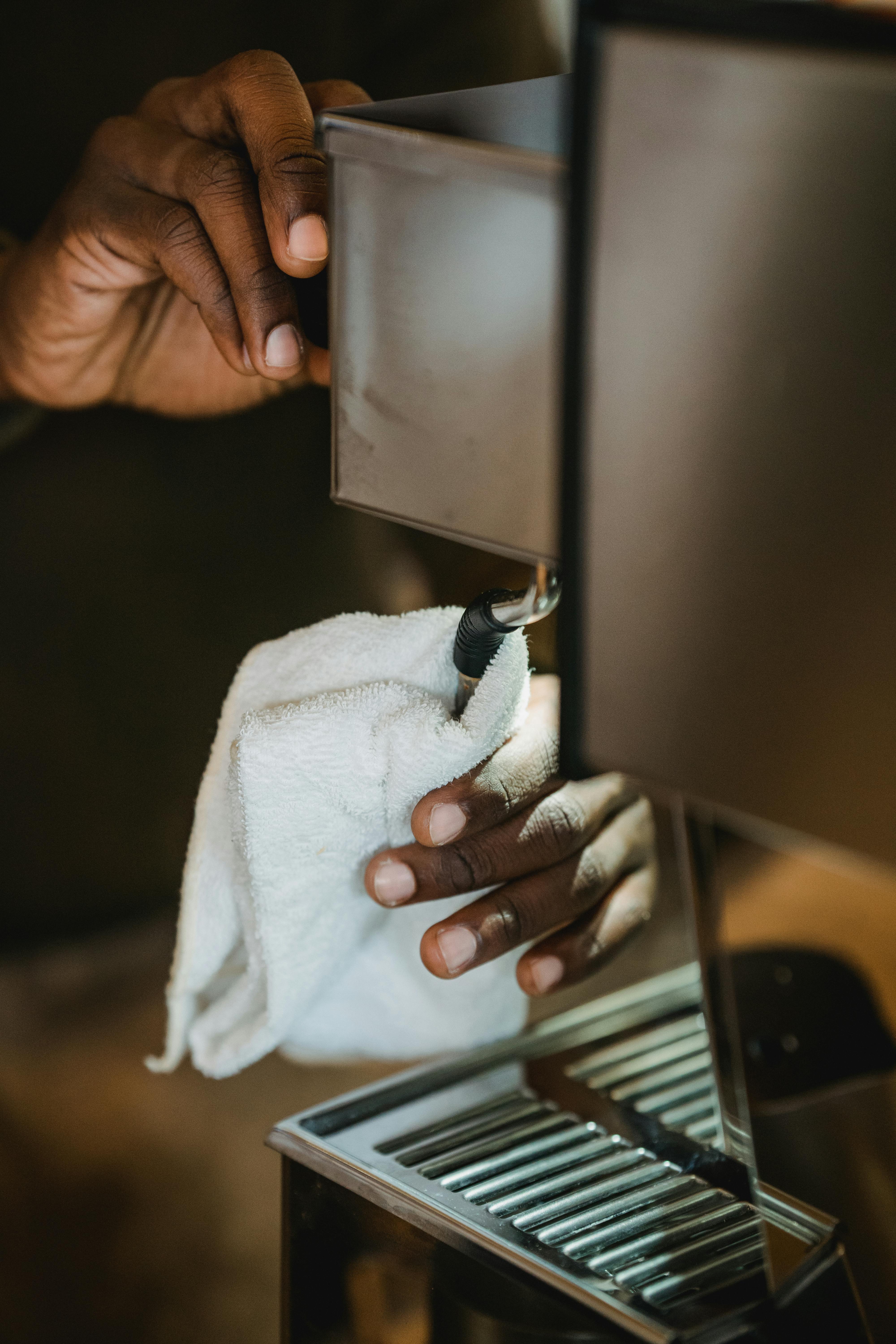 Cleaning Portafilter in Close Up · Free Stock Photo