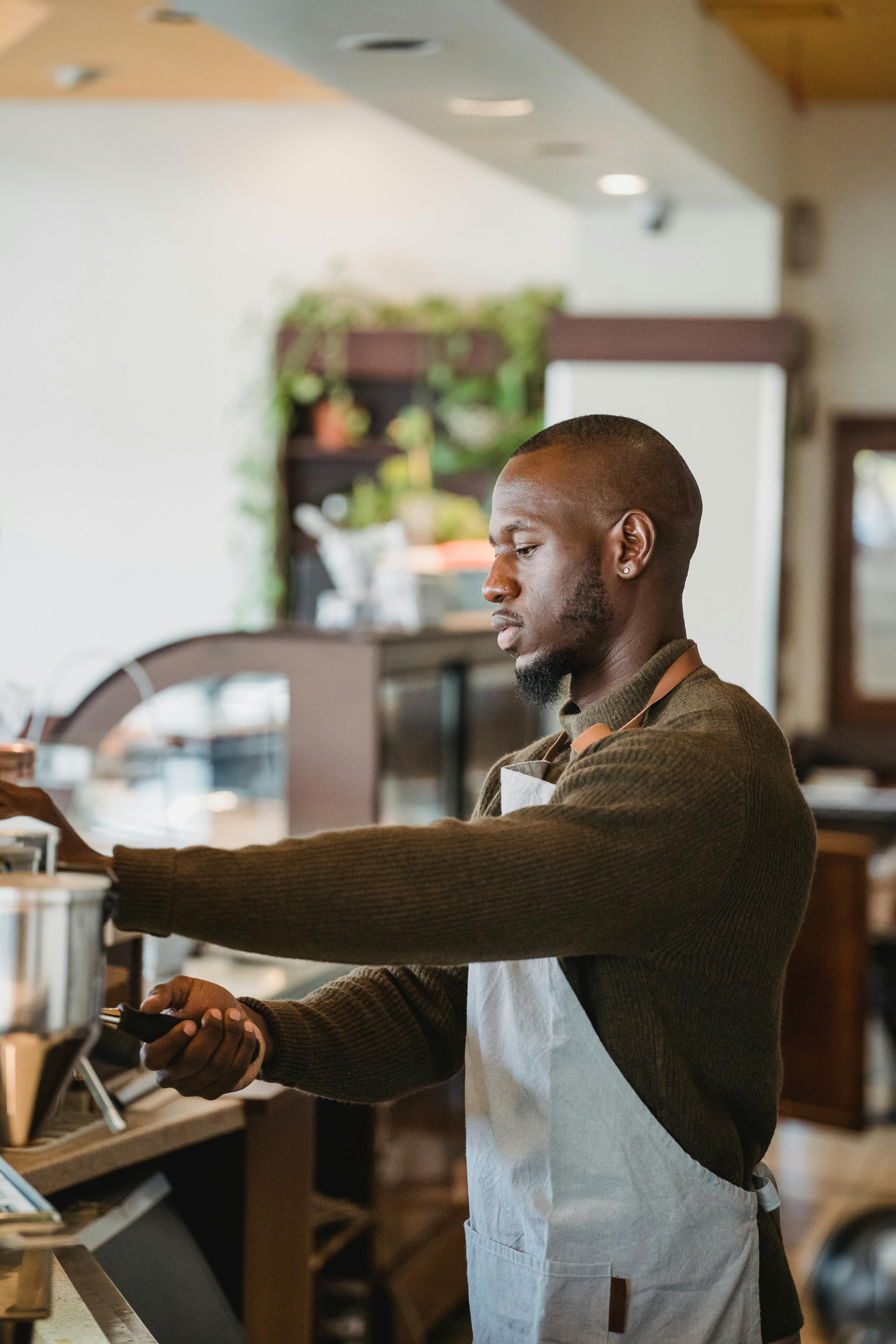 Barista Working in Cafe · Free Stock Photo