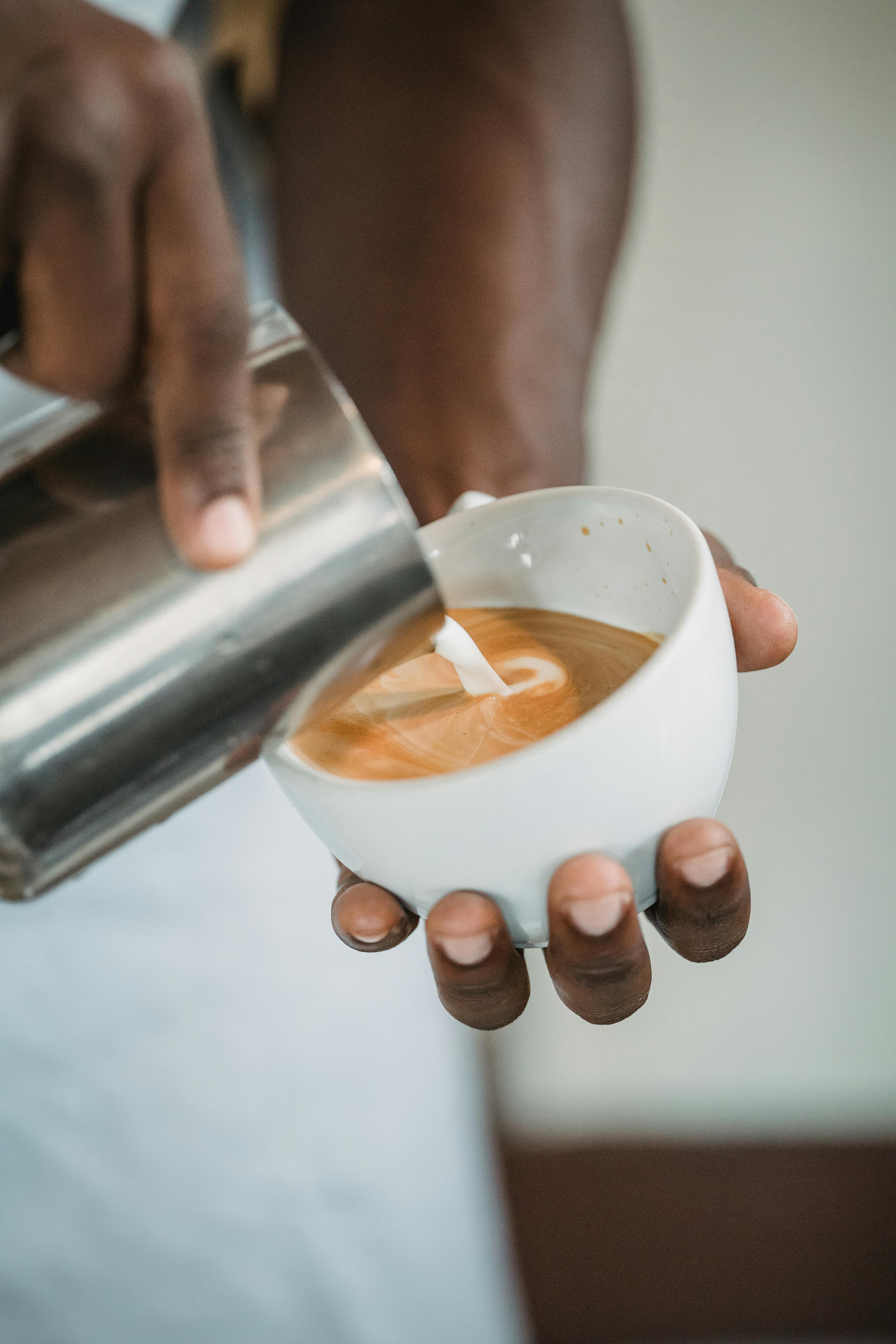 Man Making Coffee in Cafe · Free Stock Photo