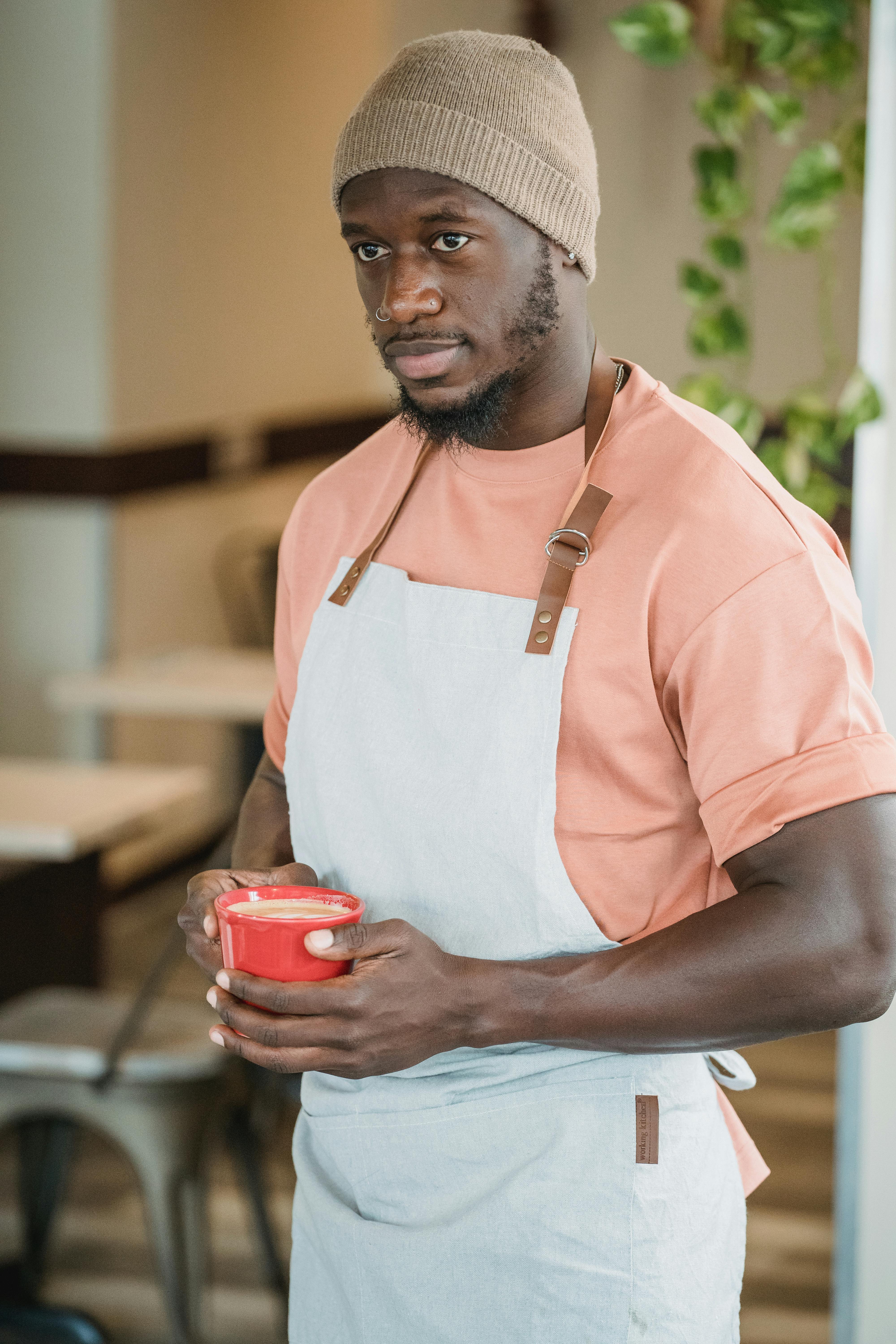 Man Carrying Glass Of Coffee · Free Stock Photo