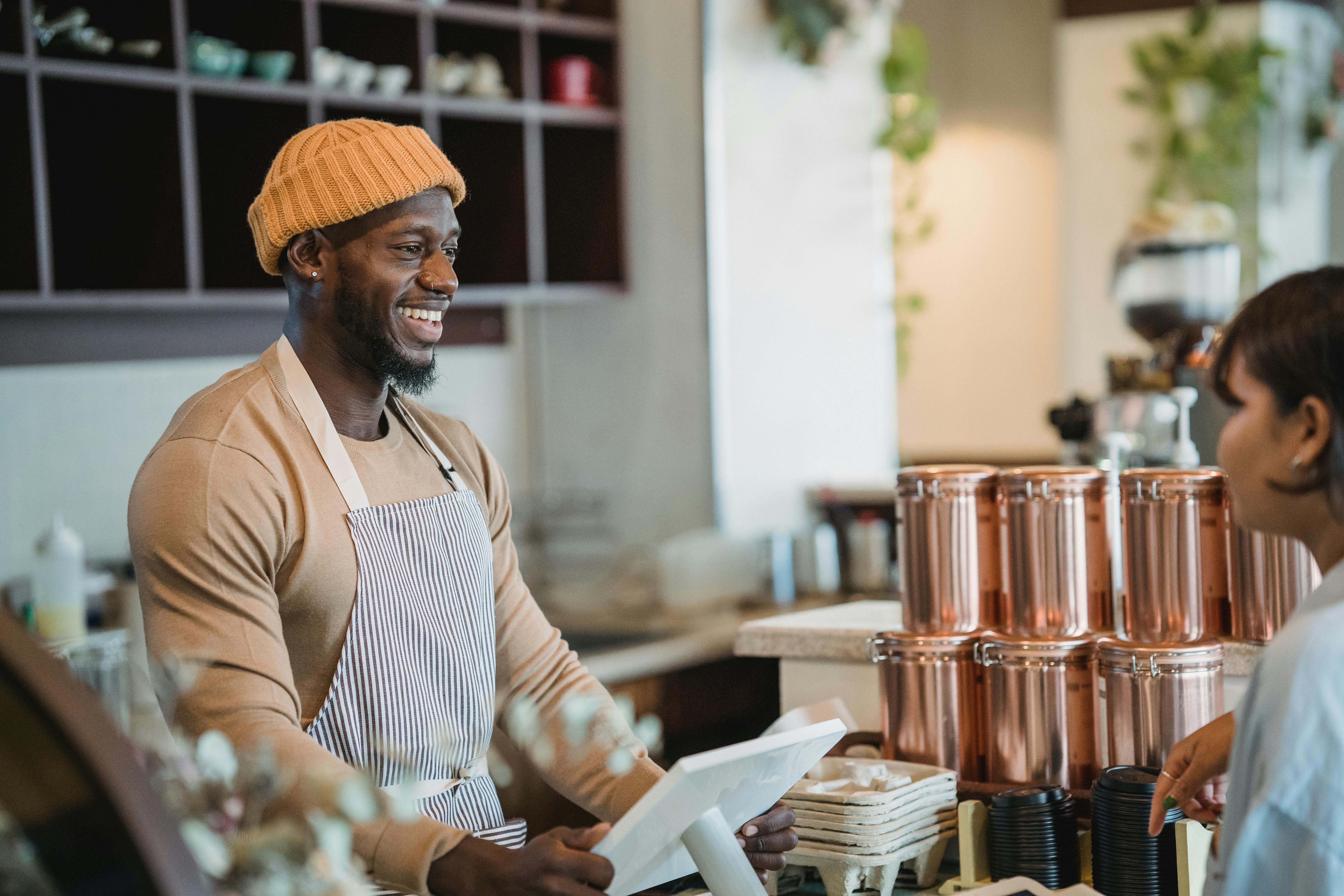 Woman Ordering Coffee in Cafe · Free Stock Photo