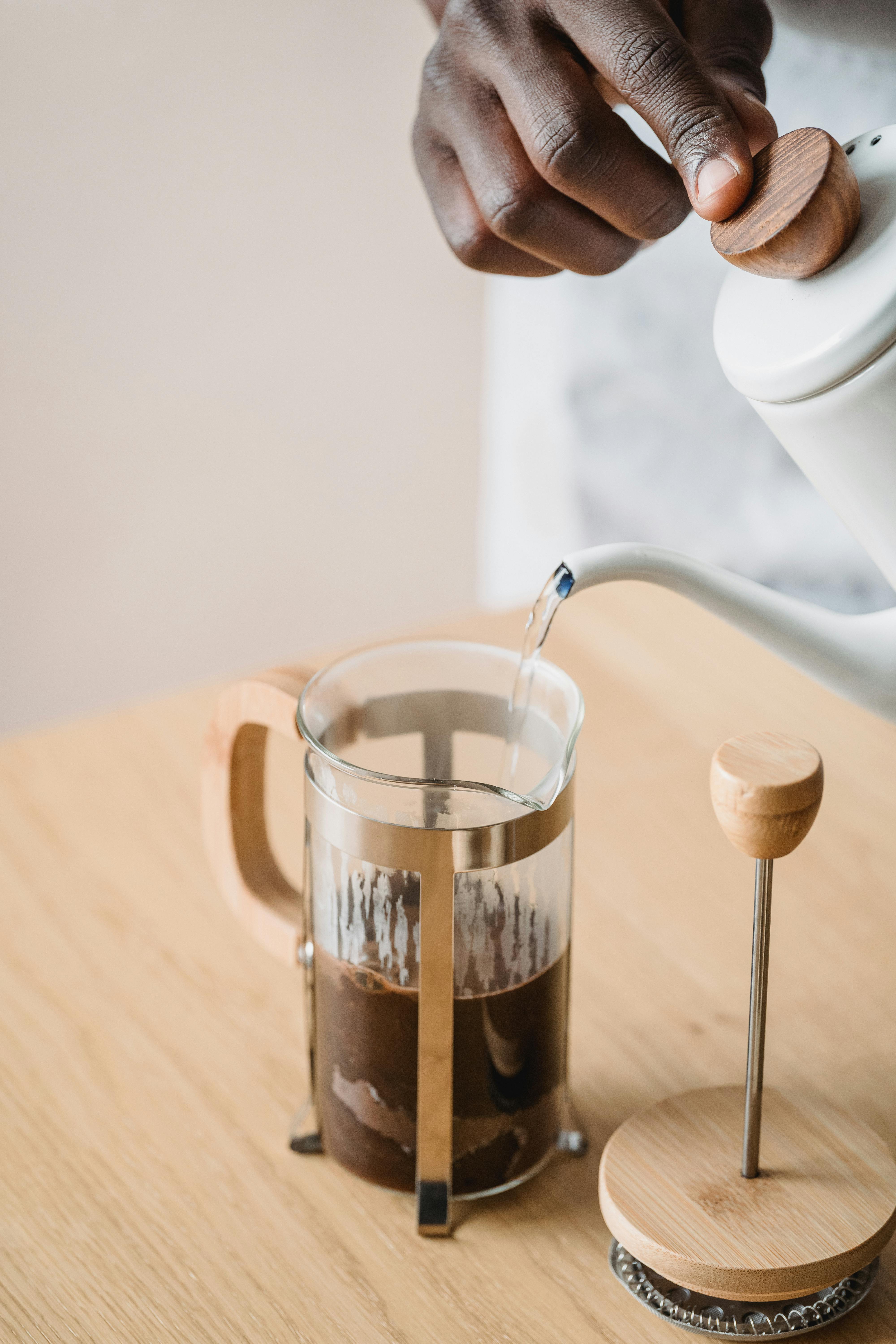 Pouring Coffee to Glass · Free Stock Photo