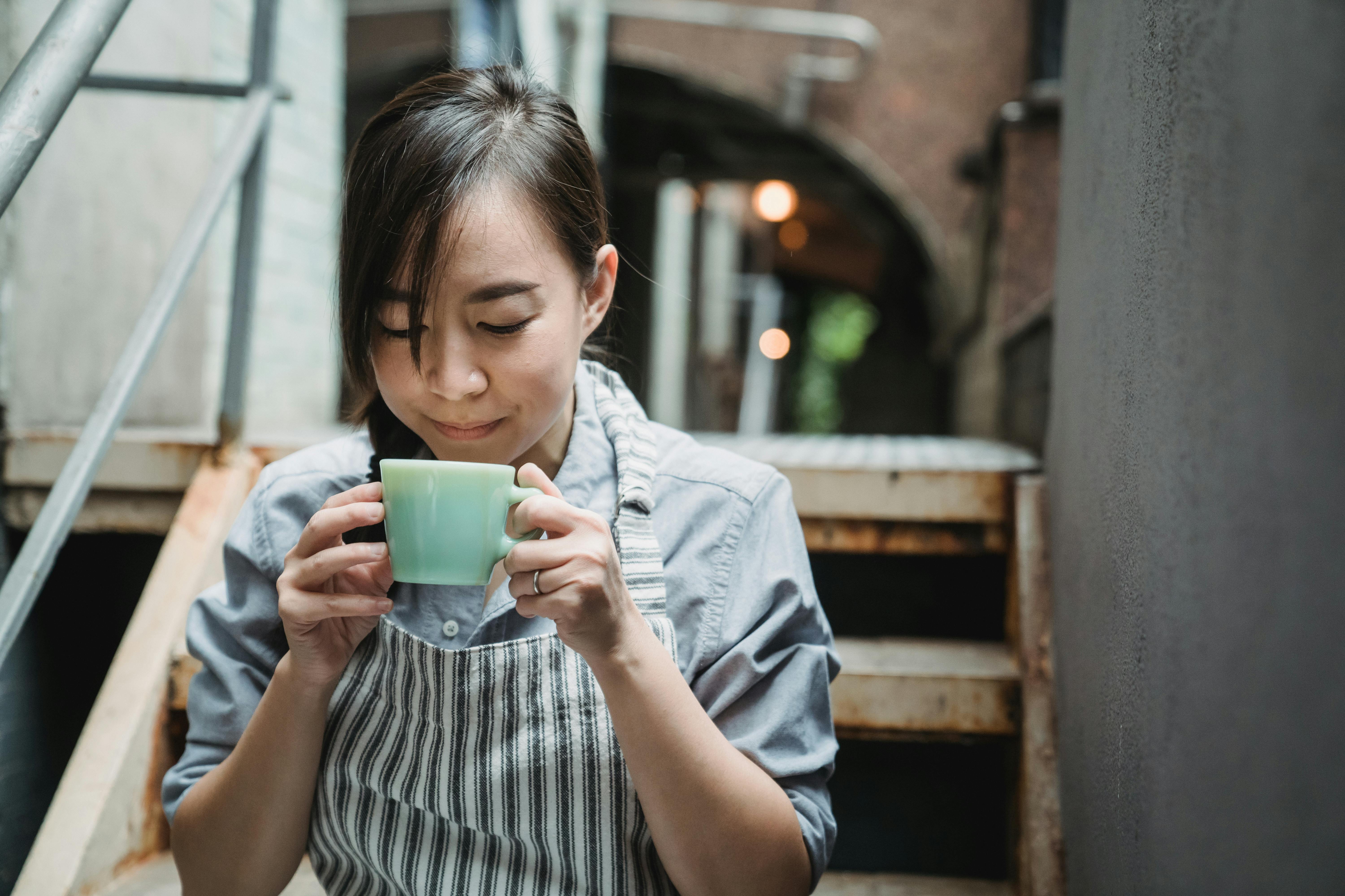 Woman Having a Coffee Break · Free Stock Photo
