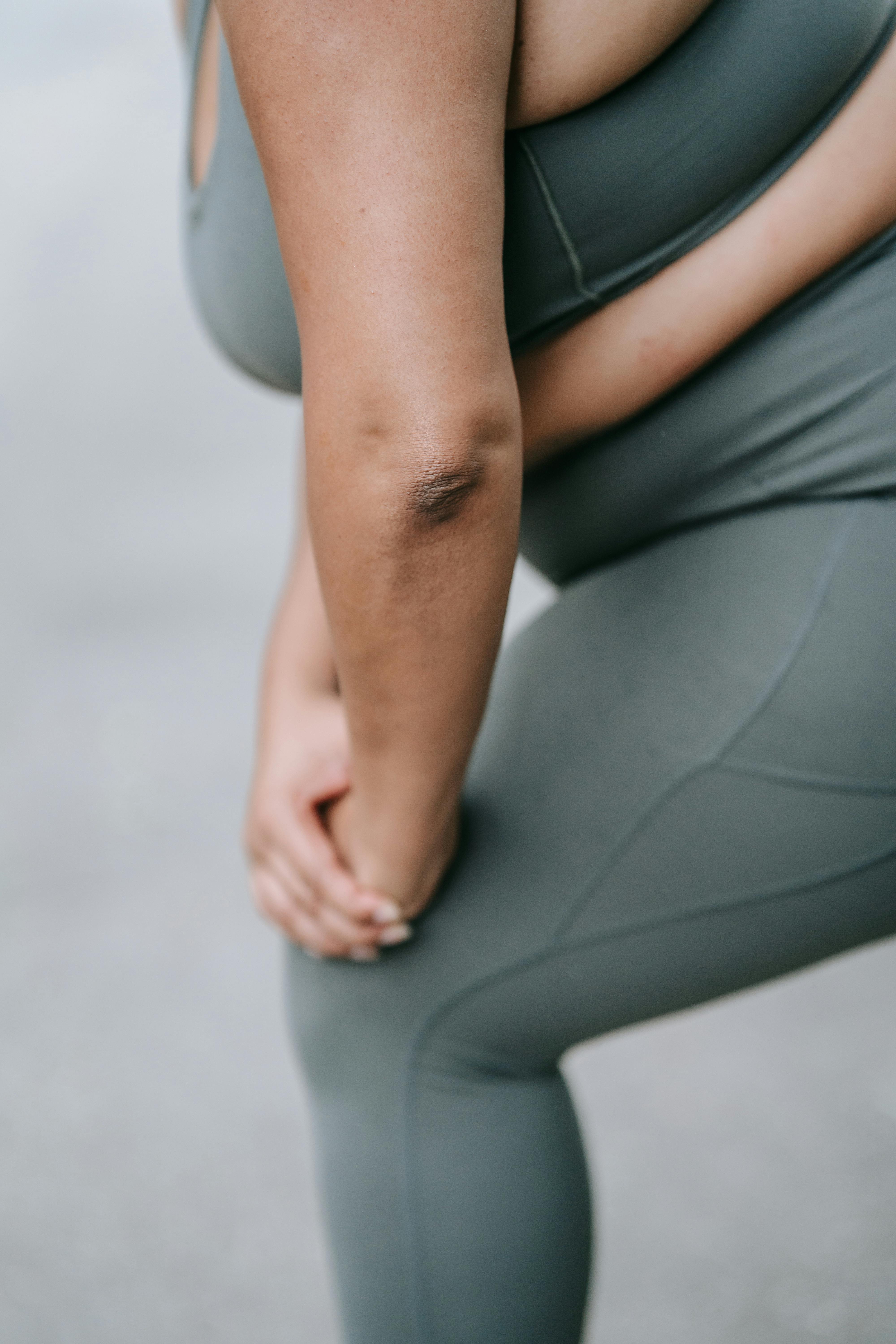 Close-Up Photo of a Person's Hand Touching Body of Water · Free Stock Photo