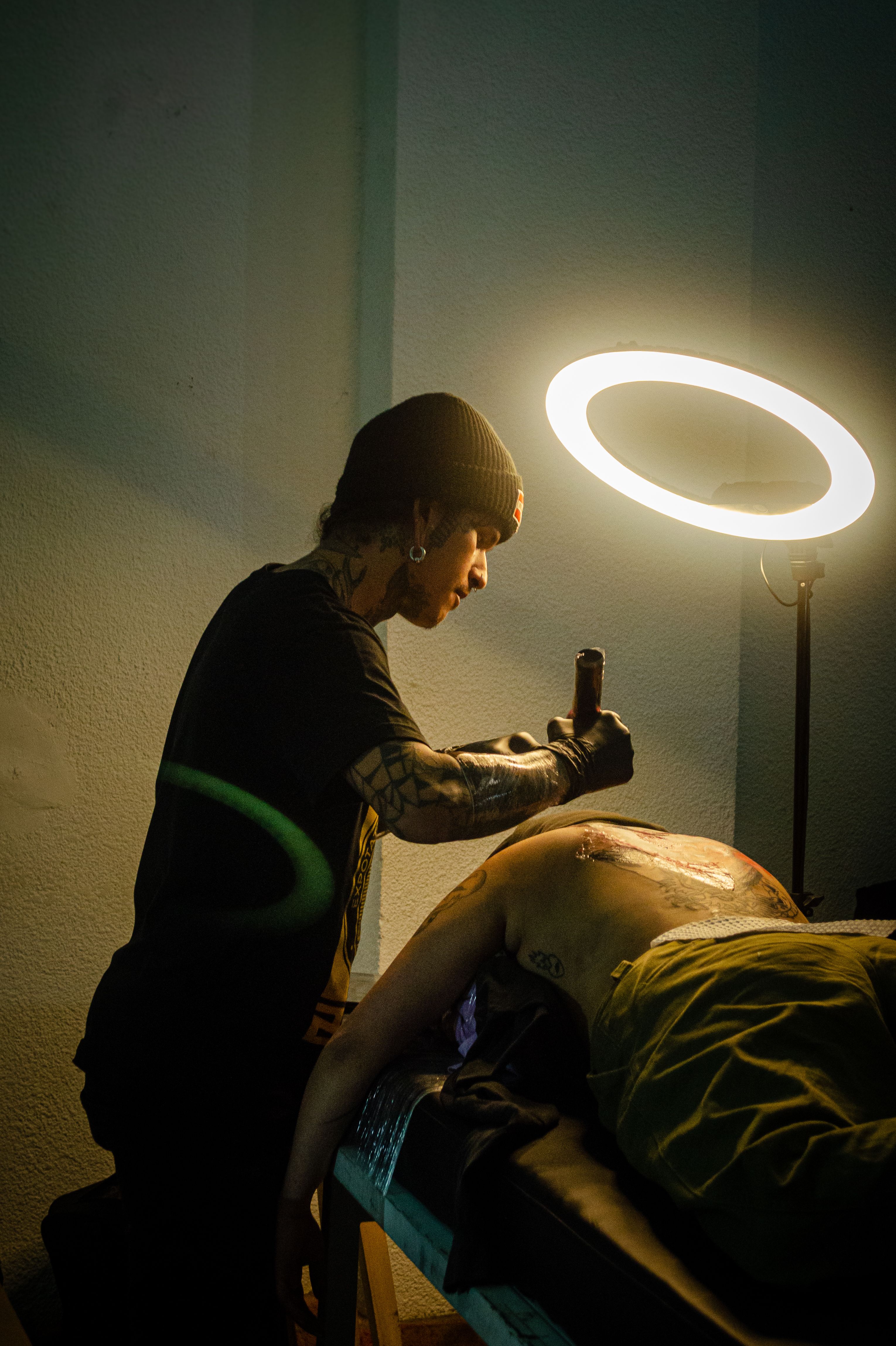 Man Getting a Tattoo from a Tattoo Artist · Free Stock Photo